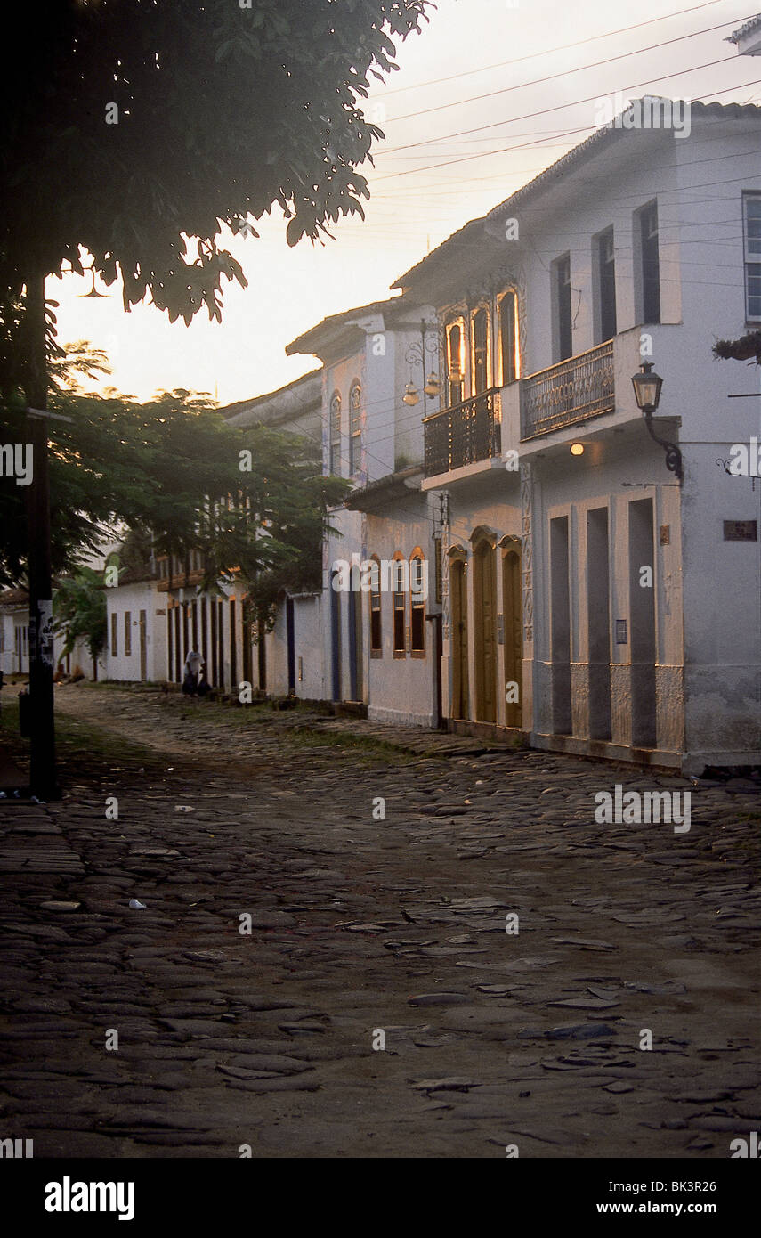 Street scene at dusk of historic colonial style buildings and ...
