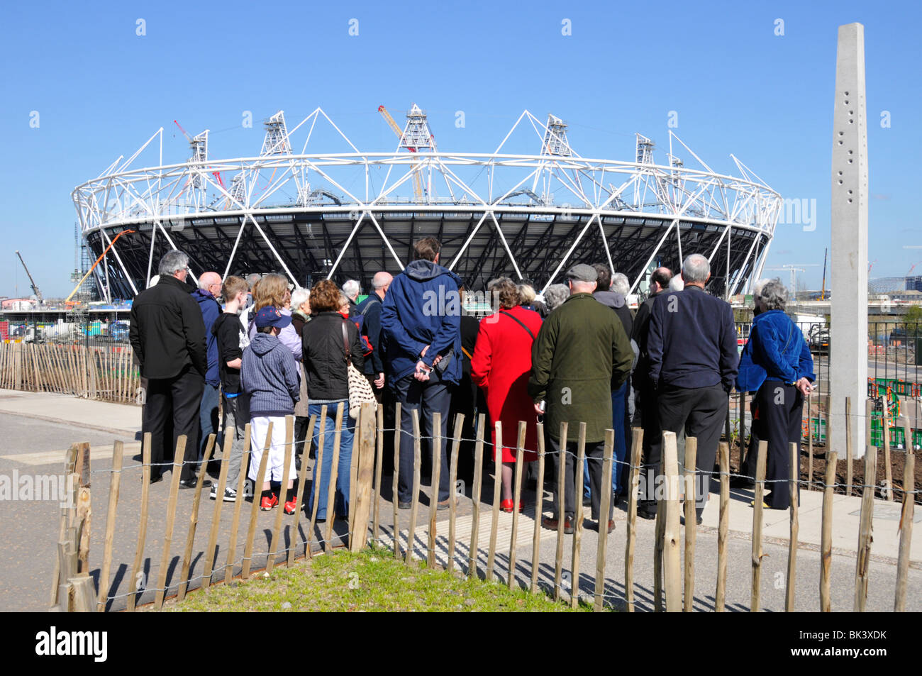 2012 Olympic Stadium construction building site men and women viewing ...