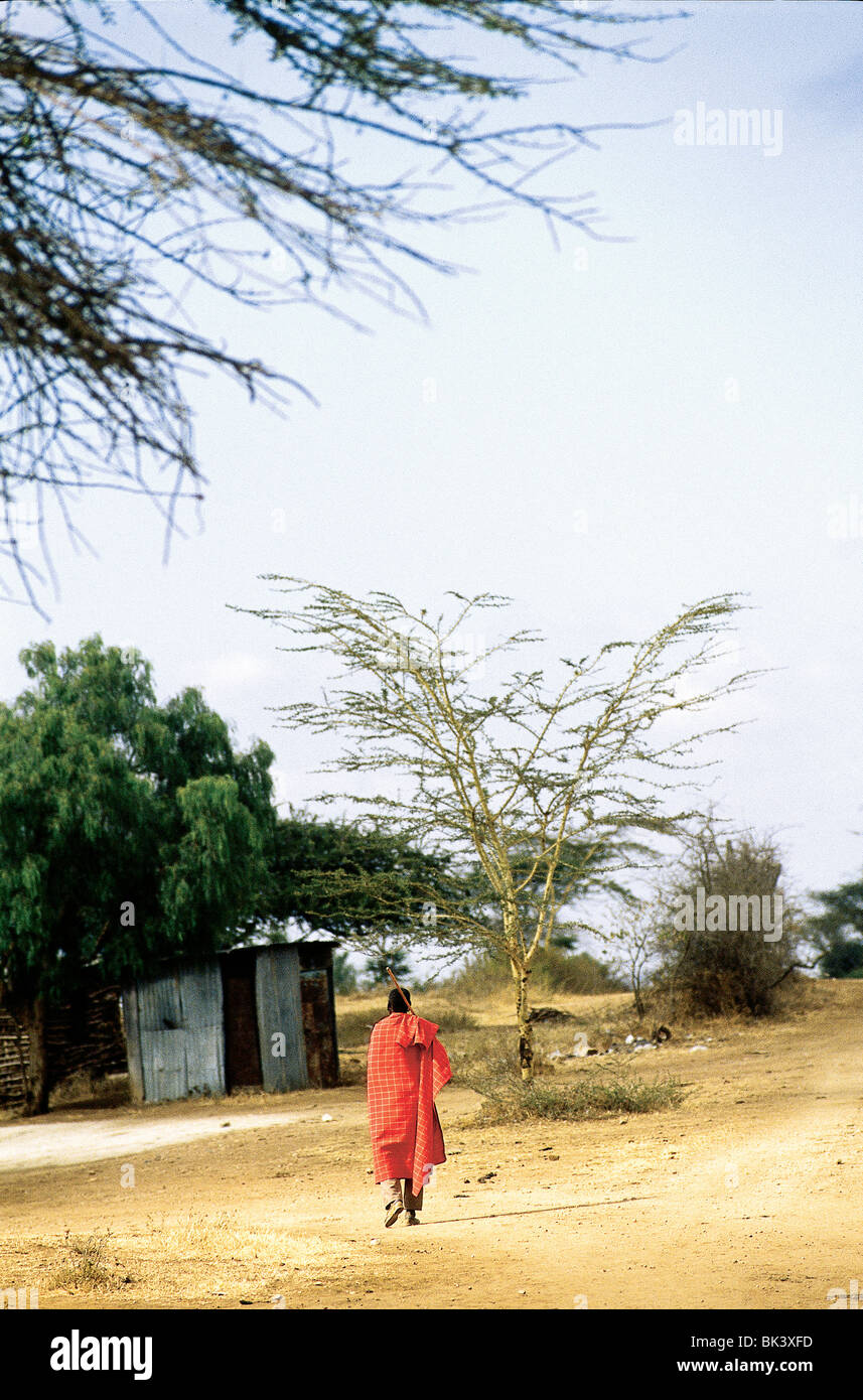 Full-length portrait of an adult wearing traditional red robes walking ...