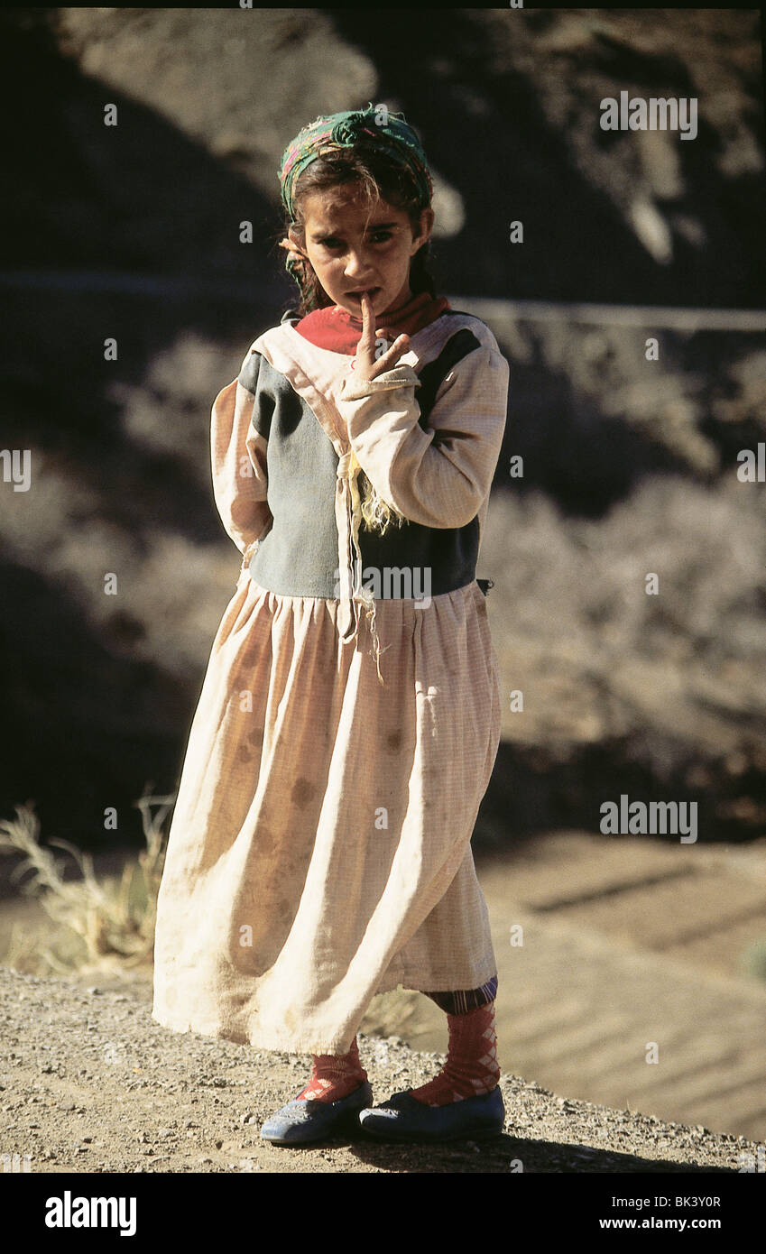 Full-length portrait of a young Moroccan girl wearing traditional dress ...