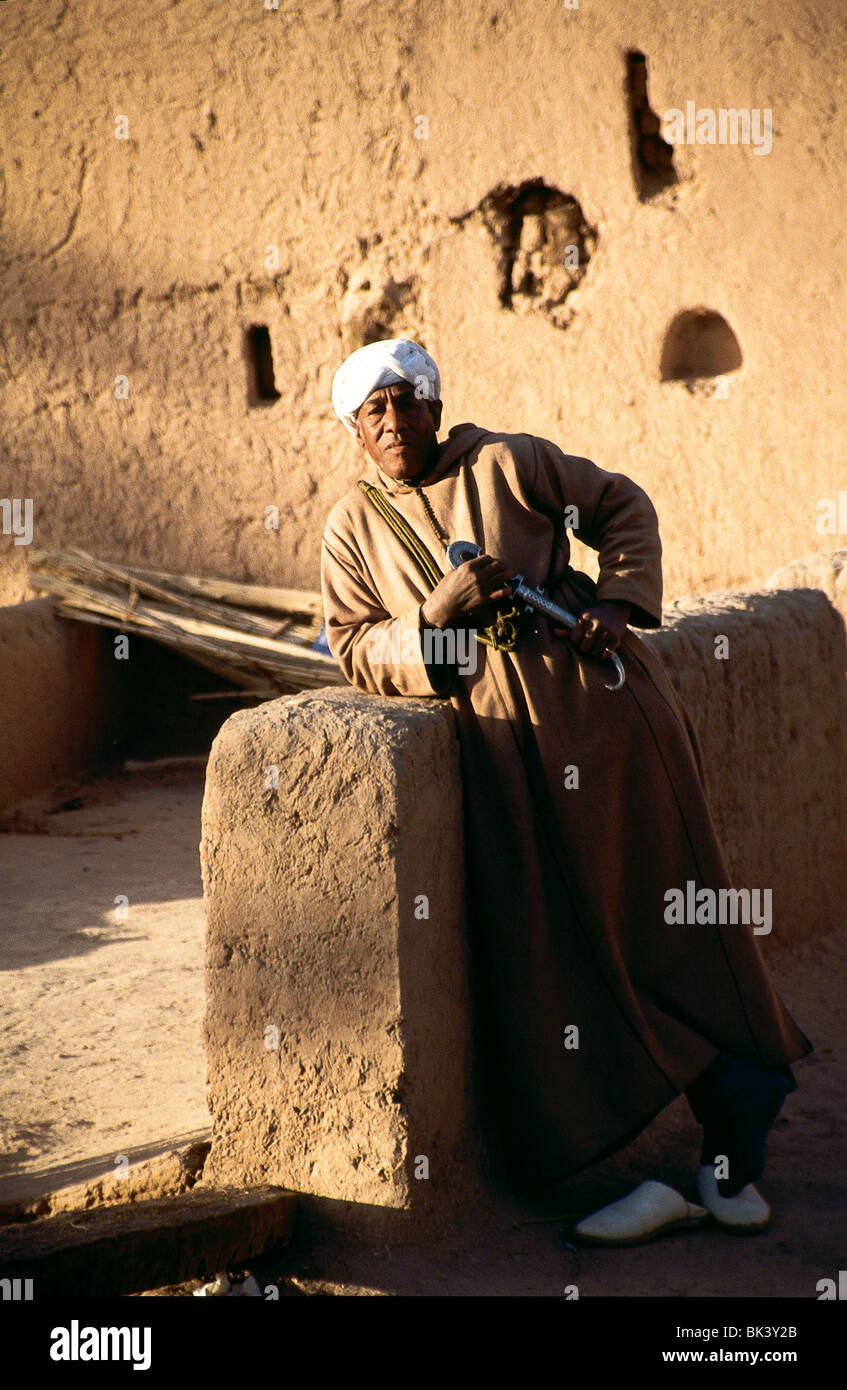 Full-length portrait of a Berber man wearing a koummya (Moroccan Berber ...