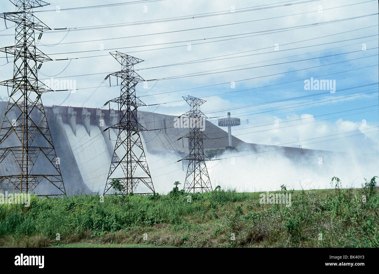 Water discharge and power lines at the Simón Bolívar Hydroelectric ...