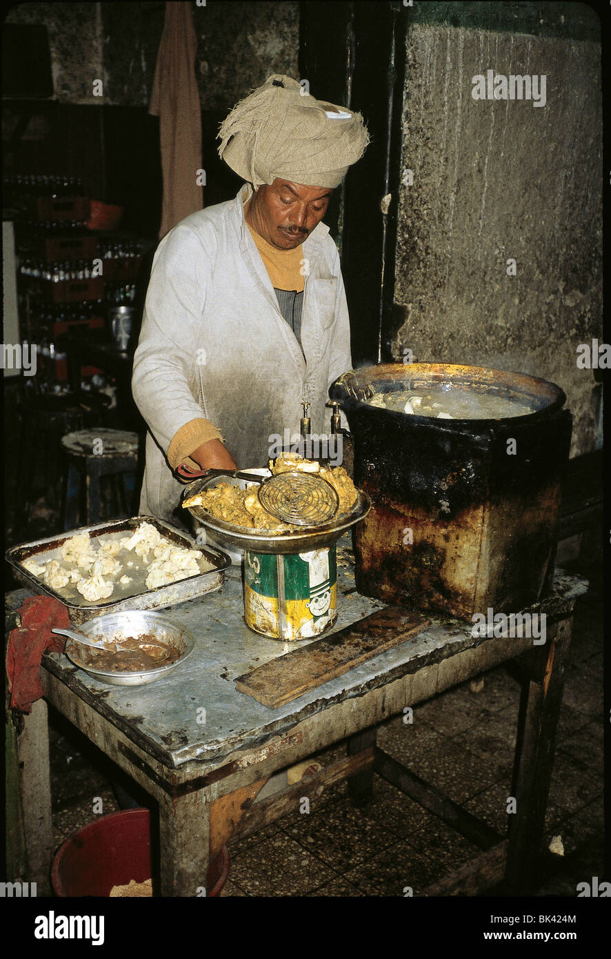 Vendor frying food, Egypt Stock Photo - Alamy