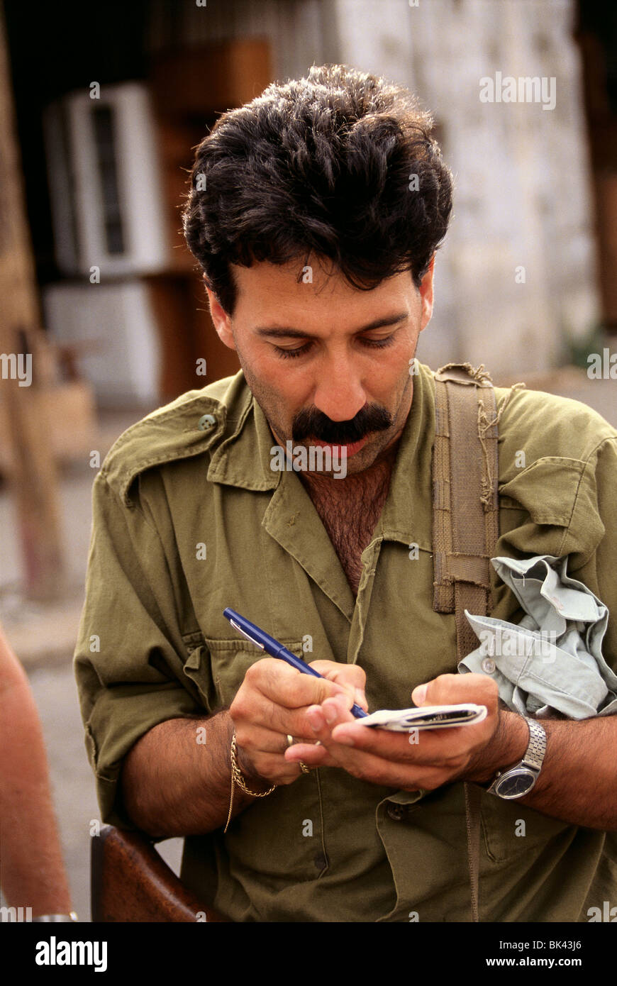 An Israeli Defense Forces soldier taking notes, Israel Stock Photo - Alamy