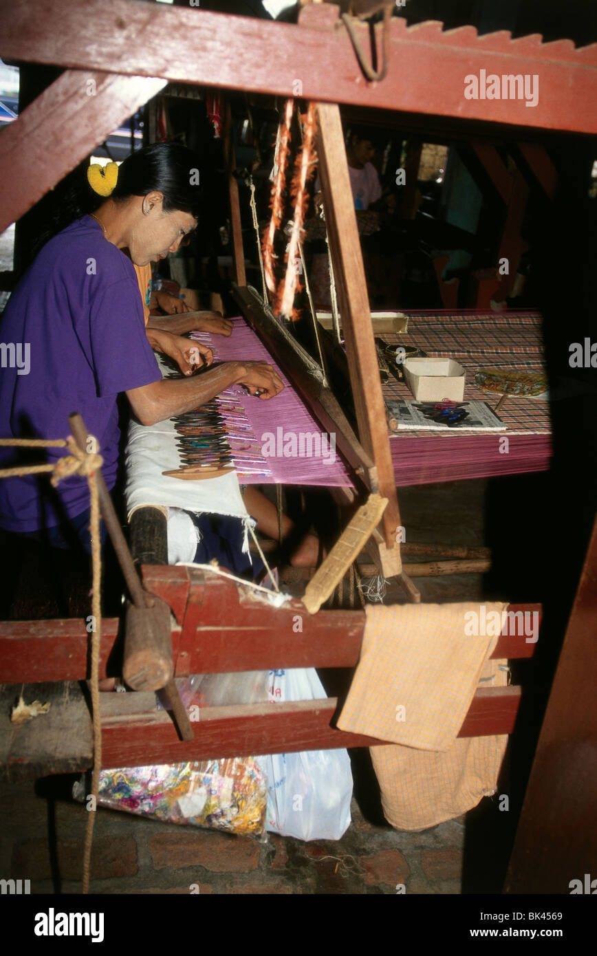 People working on a textile loom, Myanmar Stock Photo - Alamy