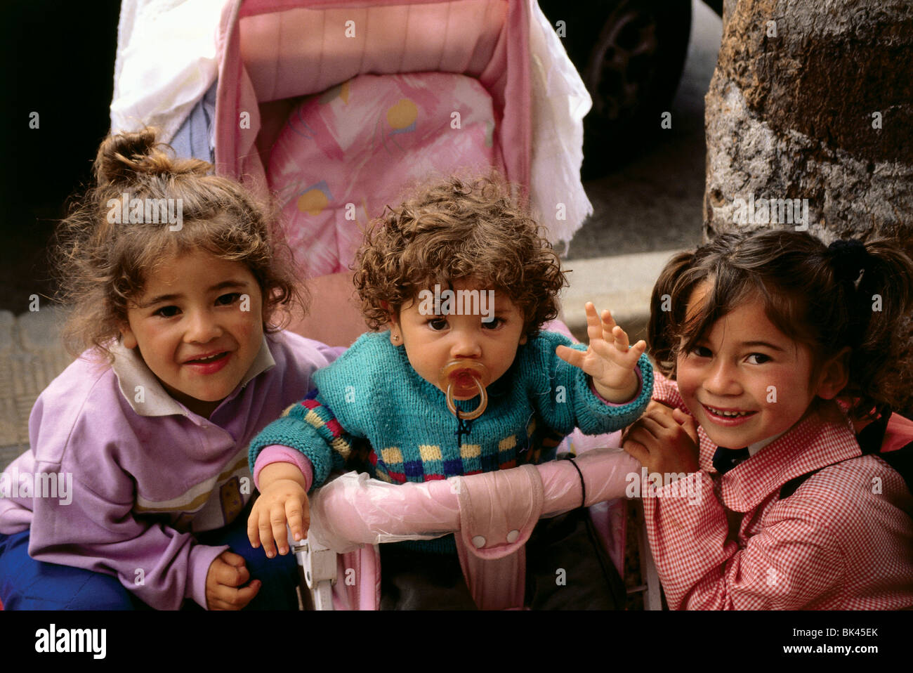 Portrait of three young children, Chile Stock Photo - Alamy