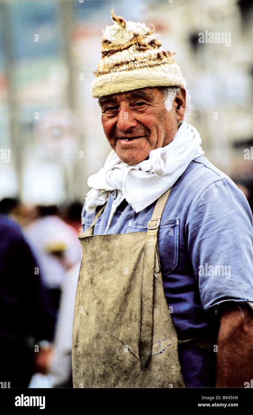 Portrait of a laborer in an outdoor vegetable market, Chile Stock Photo ...