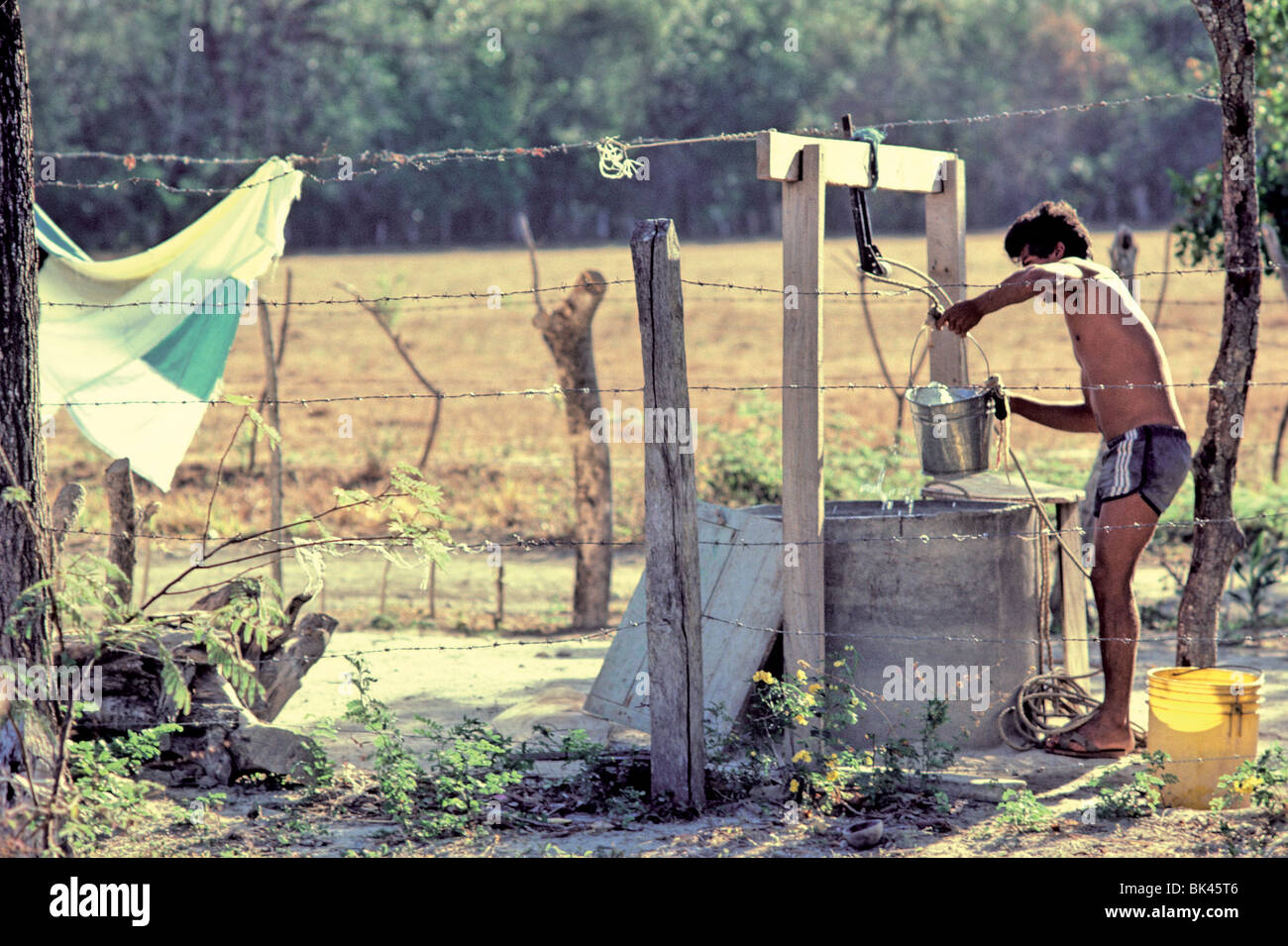 Costa rican man at a water well hi-res stock photography and images - Alamy