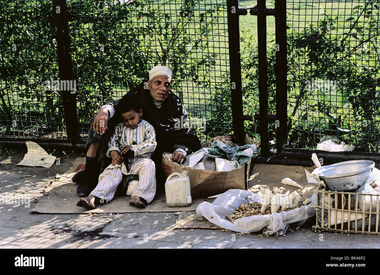 Street vendor and young child selling peanuts, Egypt Stock Photo - Alamy
