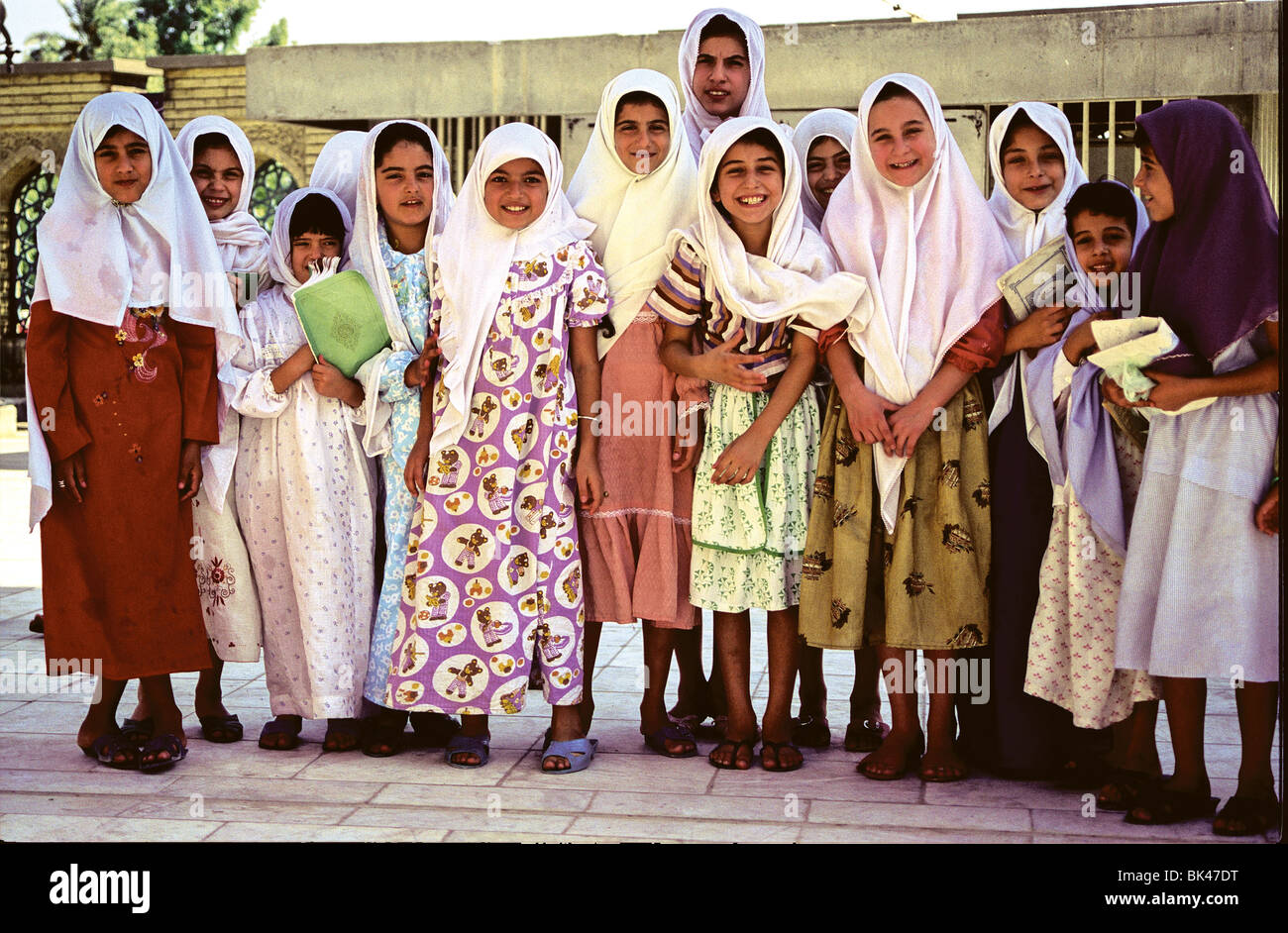 Iraqi girls in the courtyard of the Al Aman Adern Mosque, Baghdad, Iraq ...