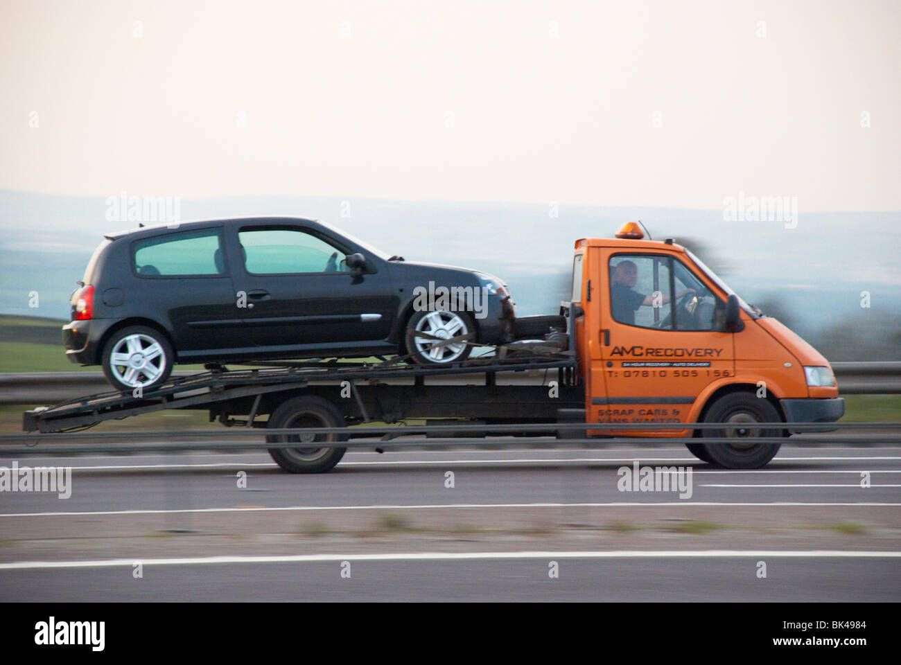 Truck moving on empty car hi-res stock photography and images - Alamy