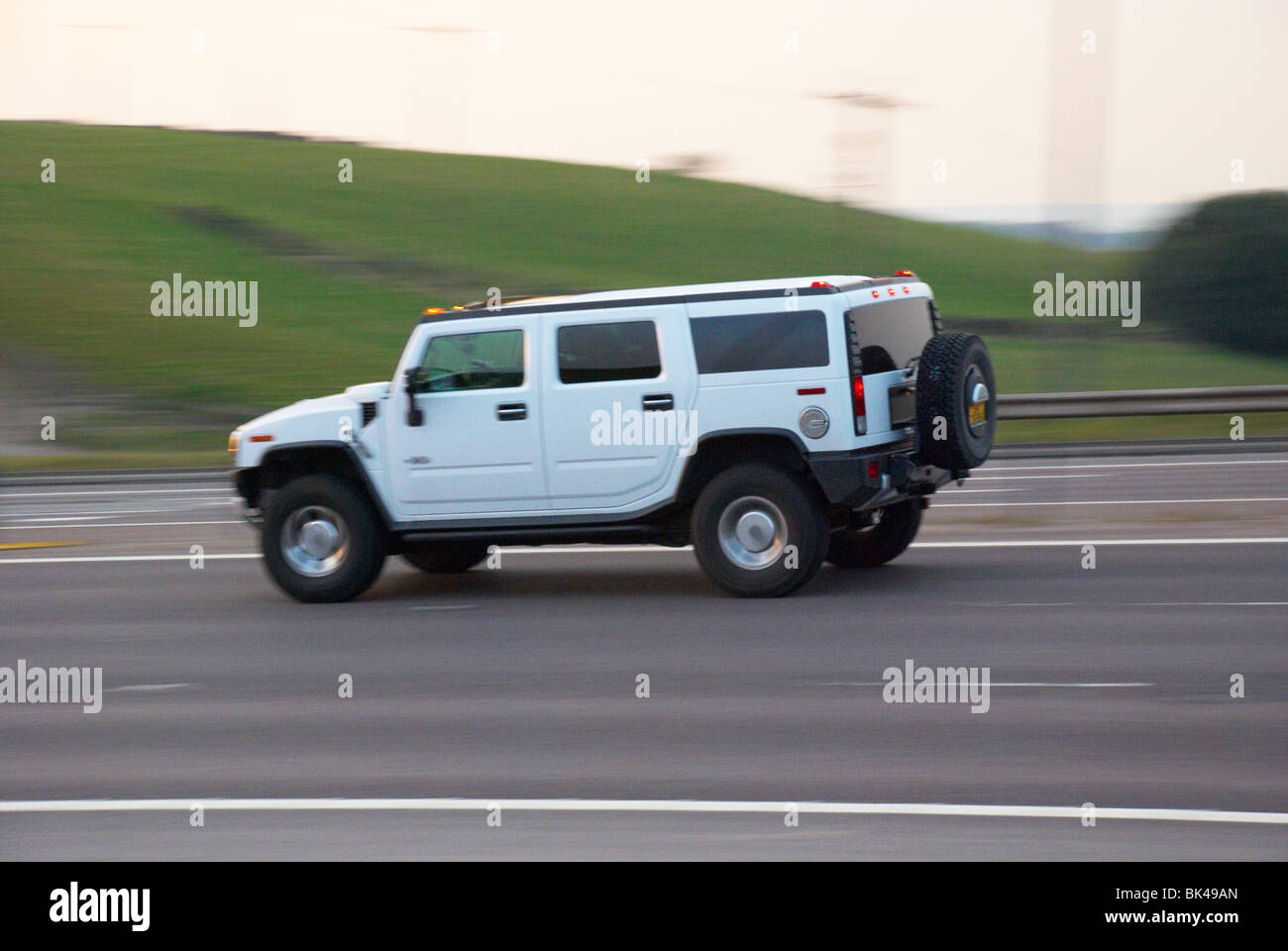 White Humvee on the road Stock Photo - Alamy