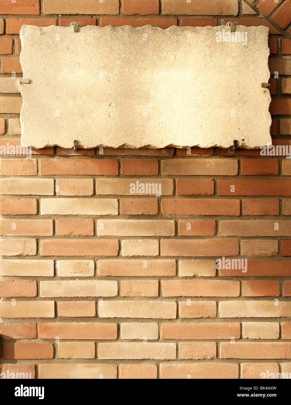 Brick wall with blank sign Stock Photo - Alamy