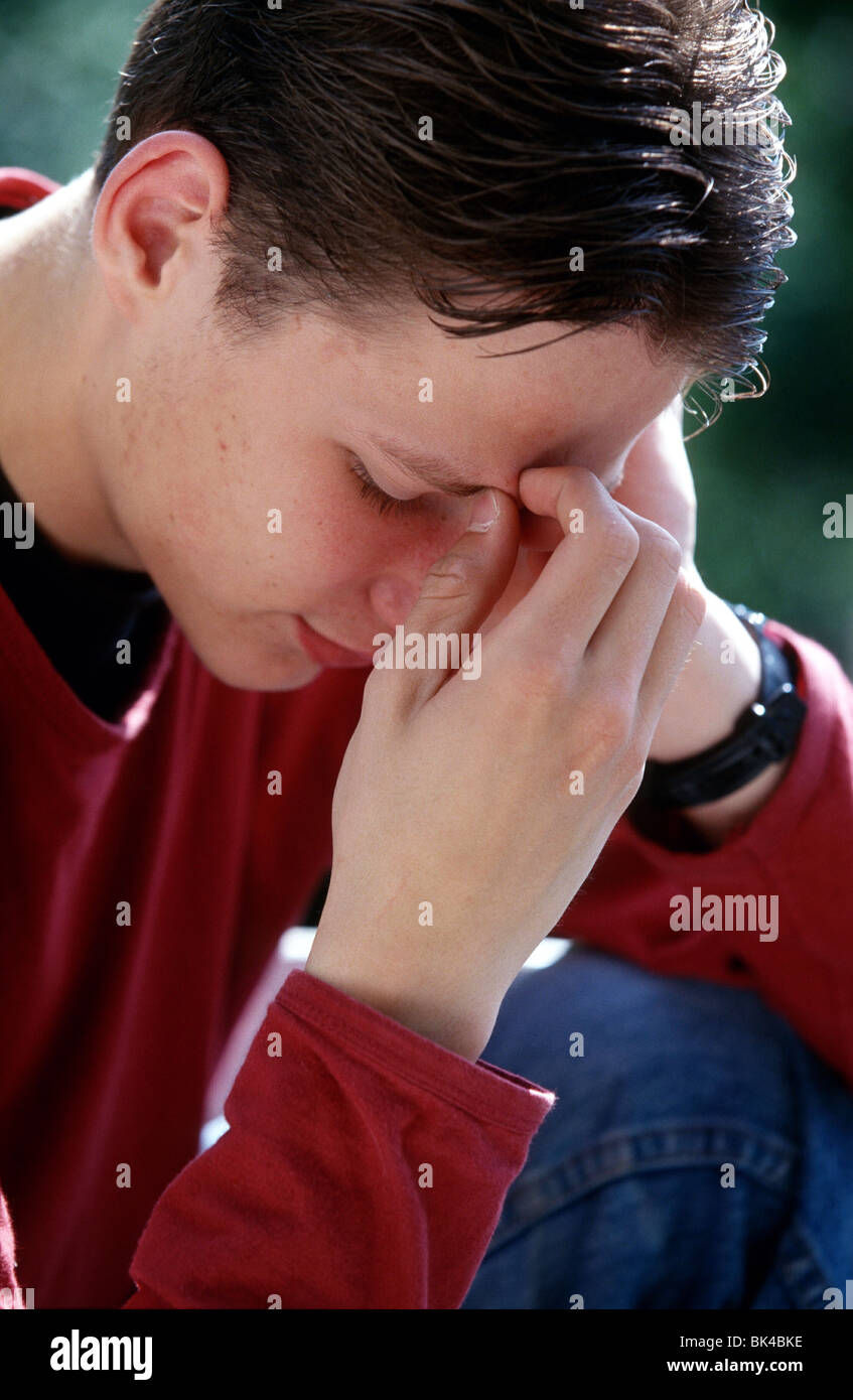 Sad young man Stock Photo - Alamy