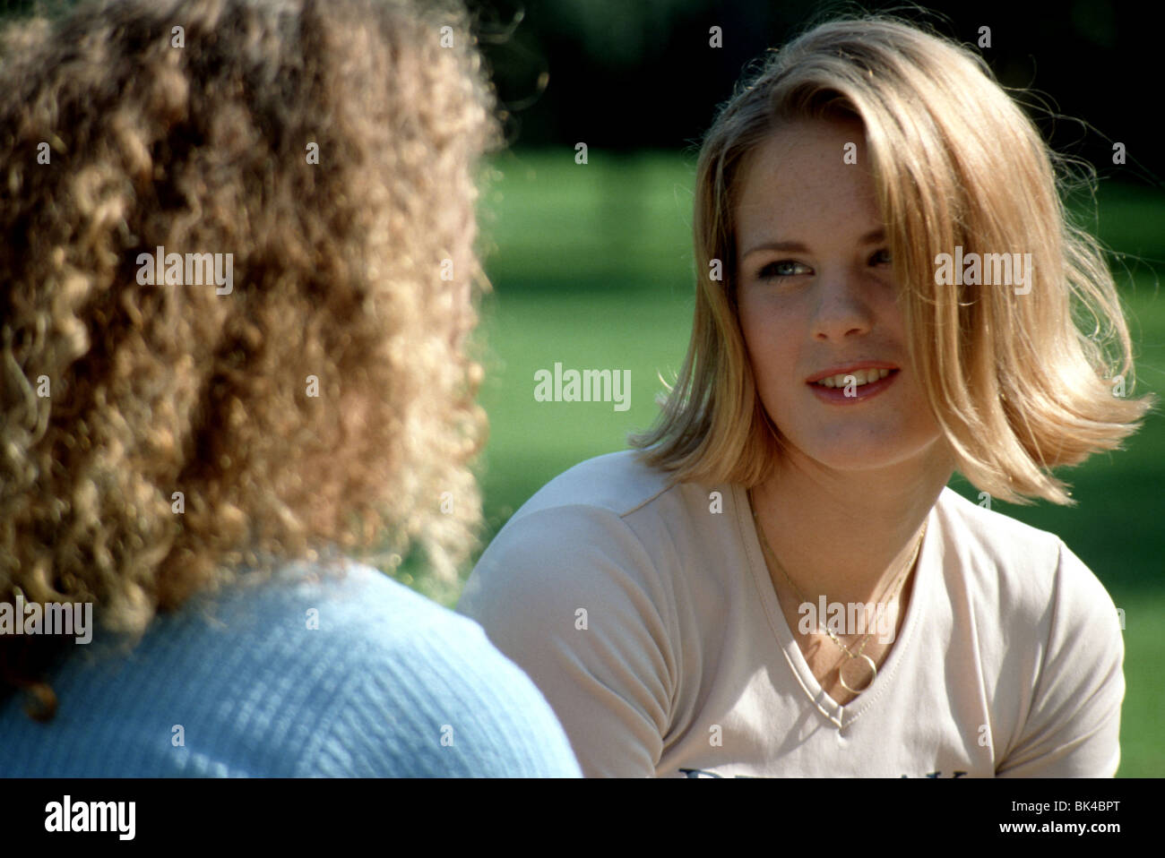 Listen to two hi-res stock photography and images - Alamy