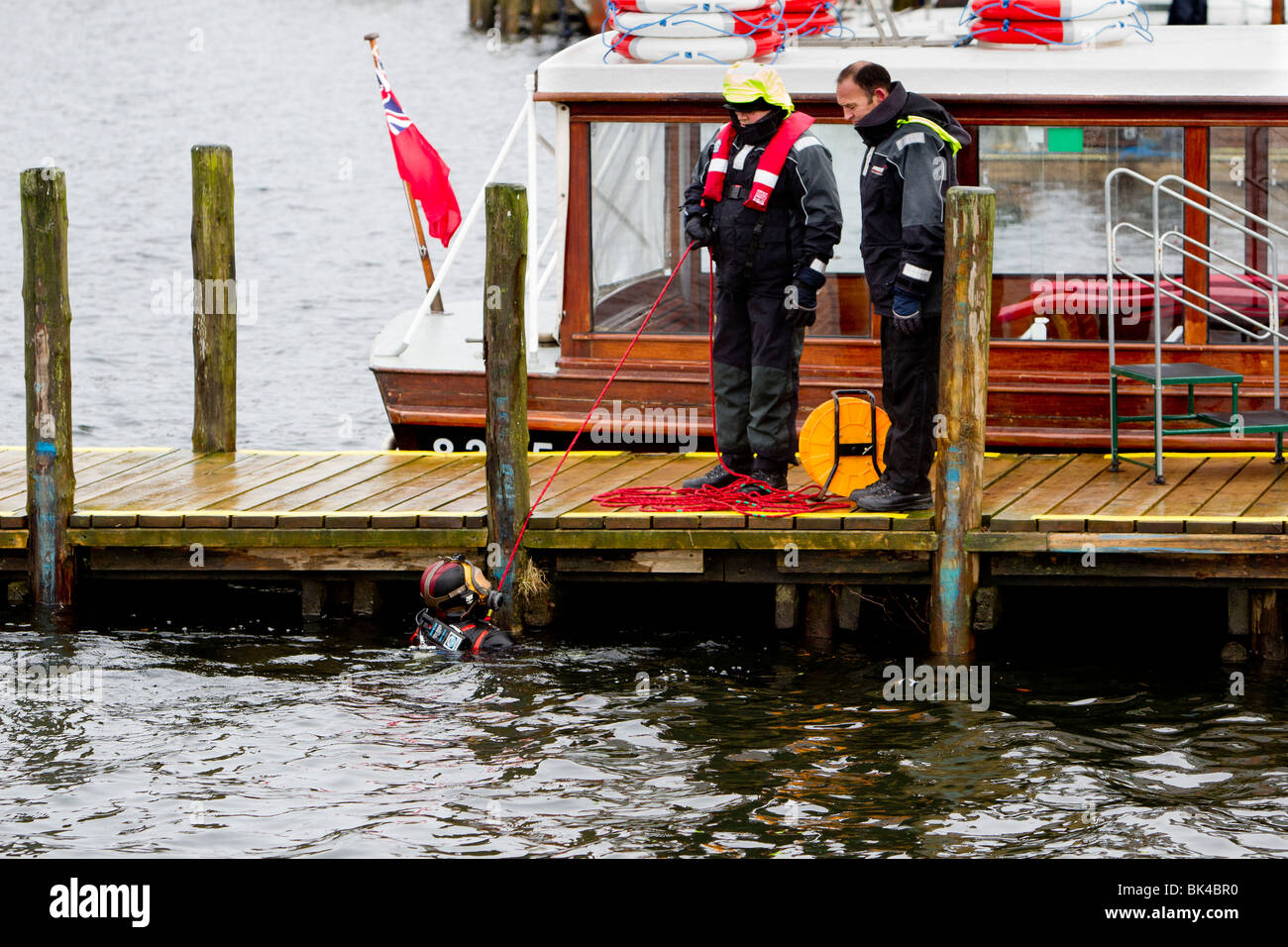 Police *Heddlu Underwater Search & Marine Unit checking Lake bed before ...