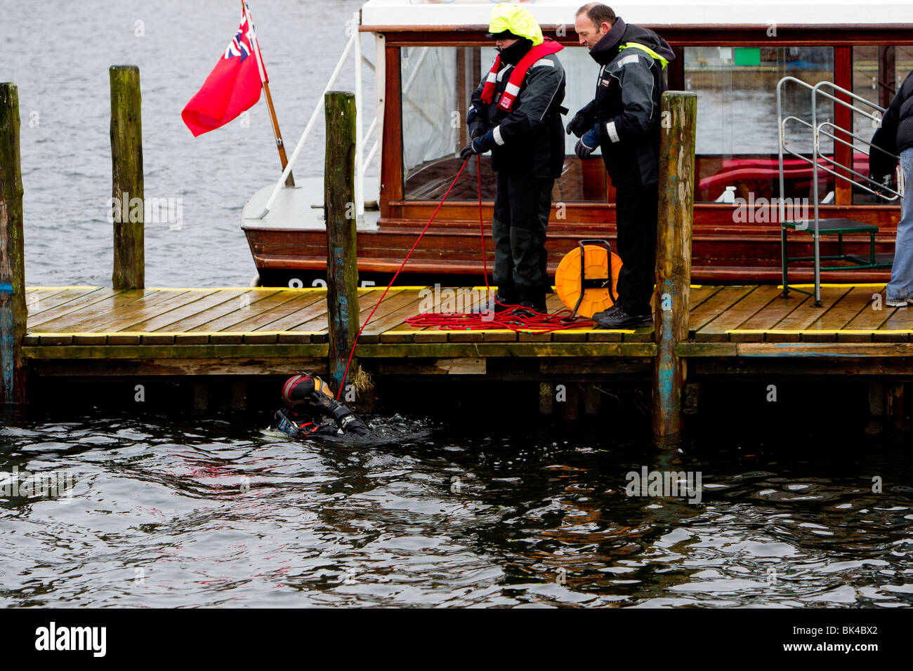 Police *Heddlu Underwater Search & Marine Unit checking Lake bed before ...