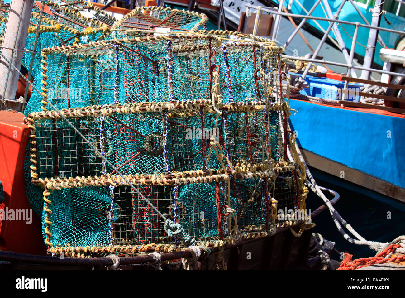Crayfish/lobster pots on fishing trawler in Hout Bay Harbour, Cape Town ...
