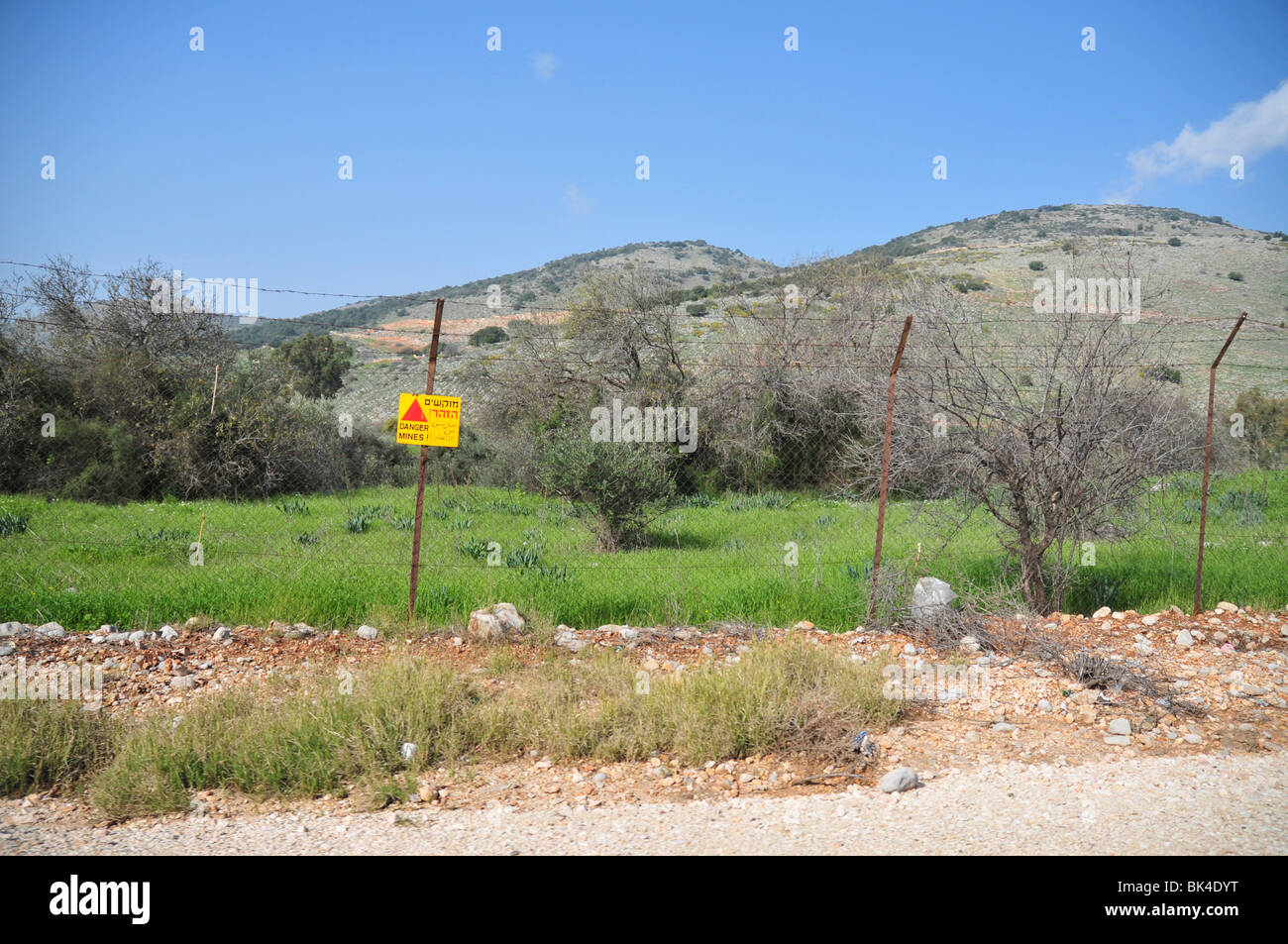 Israel, Golan Heights, an old pre Six Day War minefield with fence and ...