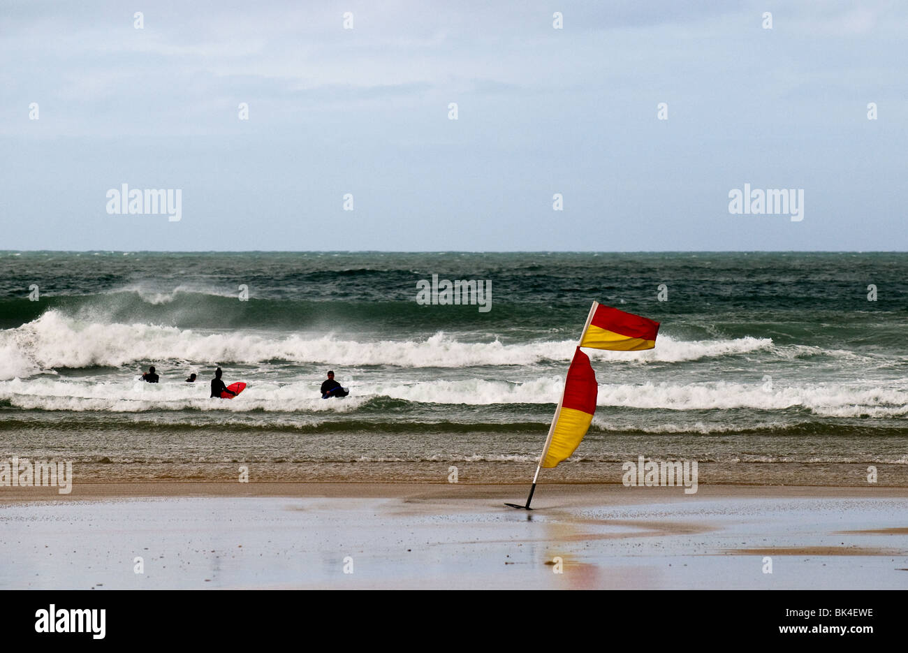A RNLI safety flag on Fistral Beach in Newquay in Cornwall. Photo by ...