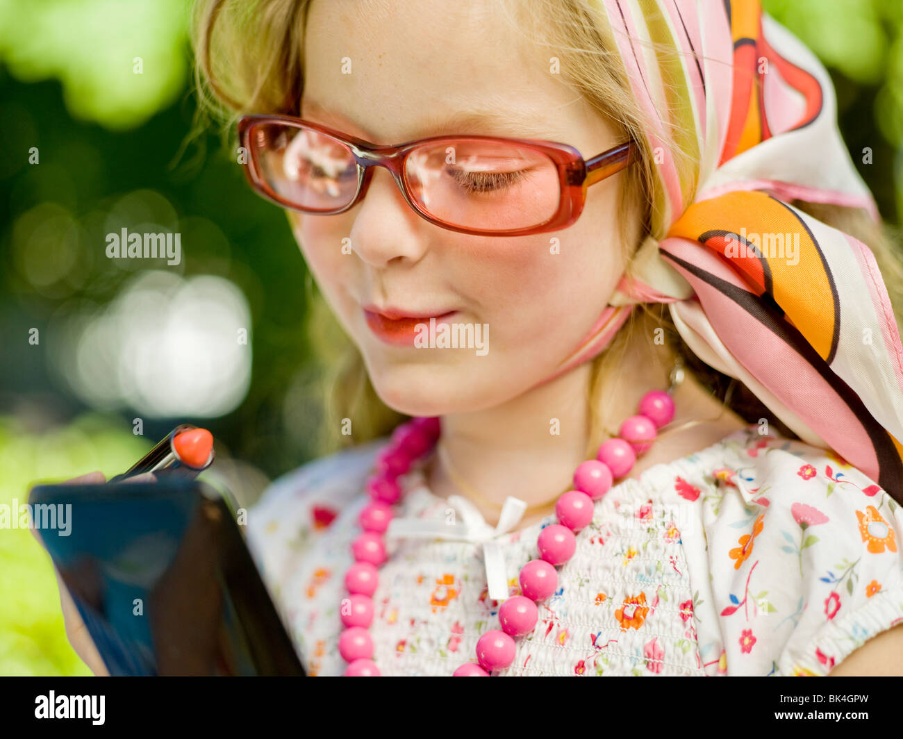 Young girl wearing colorful babushka Stock Photo - Alamy