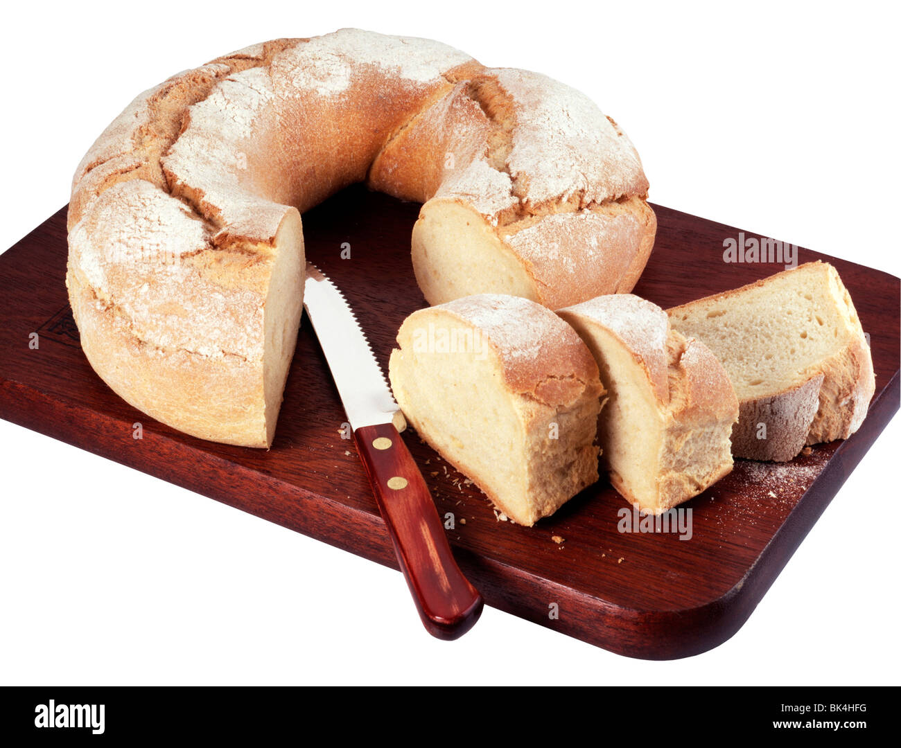 Sliced bread ring on cutting board(clipping path Stock Photo - Alamy