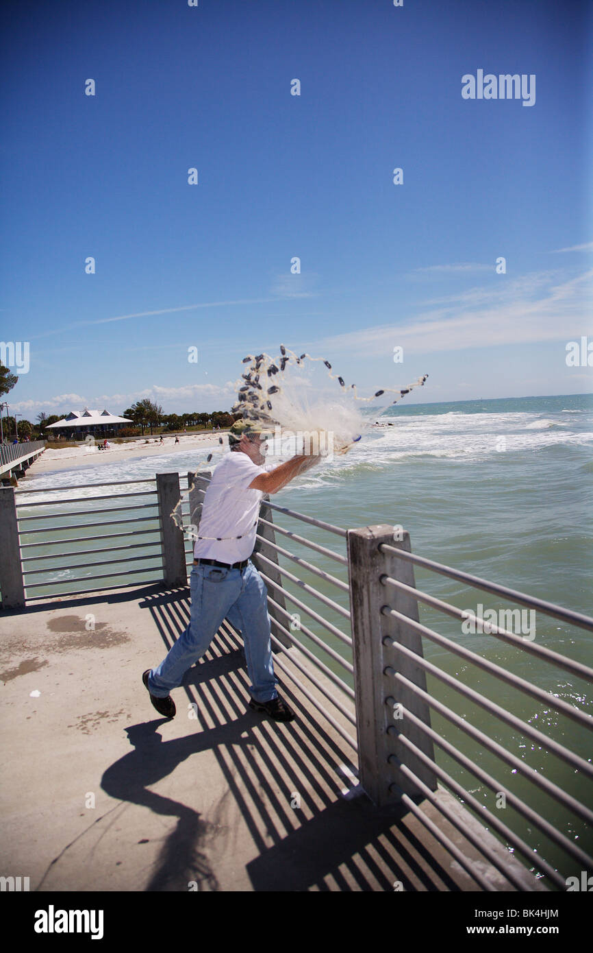 Fisherman throwing out his net hi-res stock photography and images - Alamy