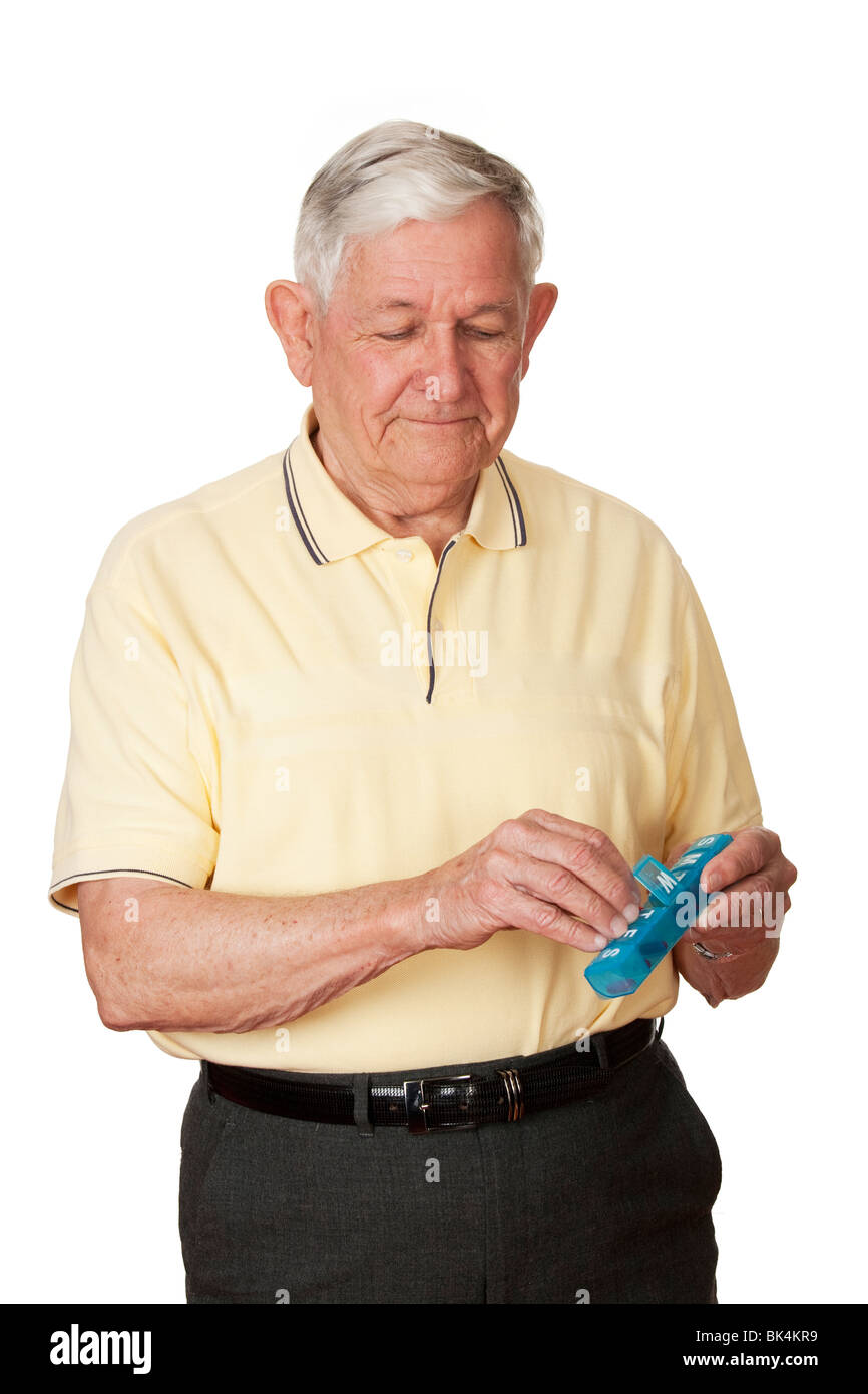 Old man holding pill box hi-res stock photography and images - Alamy