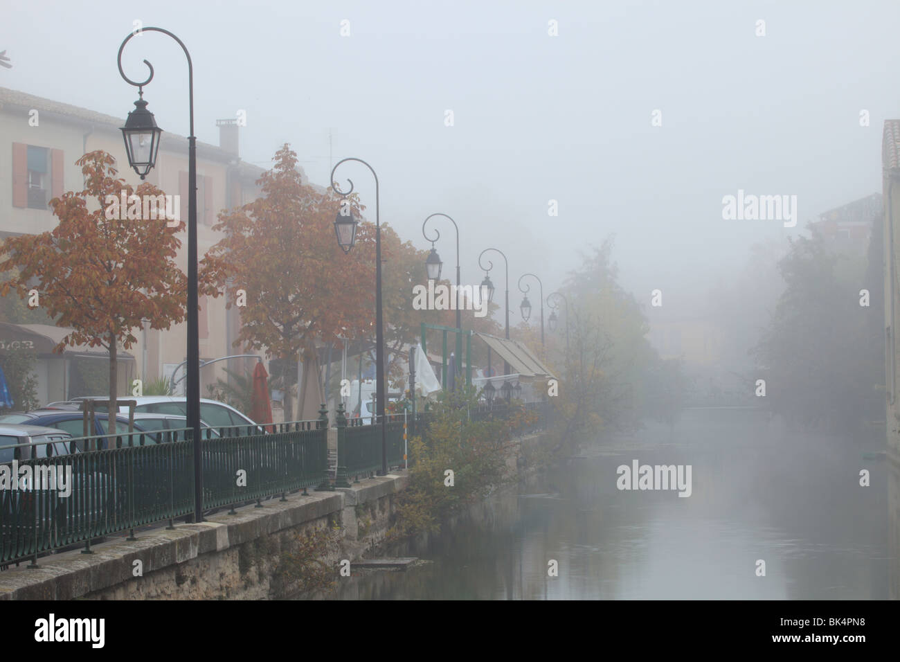Misty weather in the city of Isle sur la Sorgue Stock Photo - Alamy