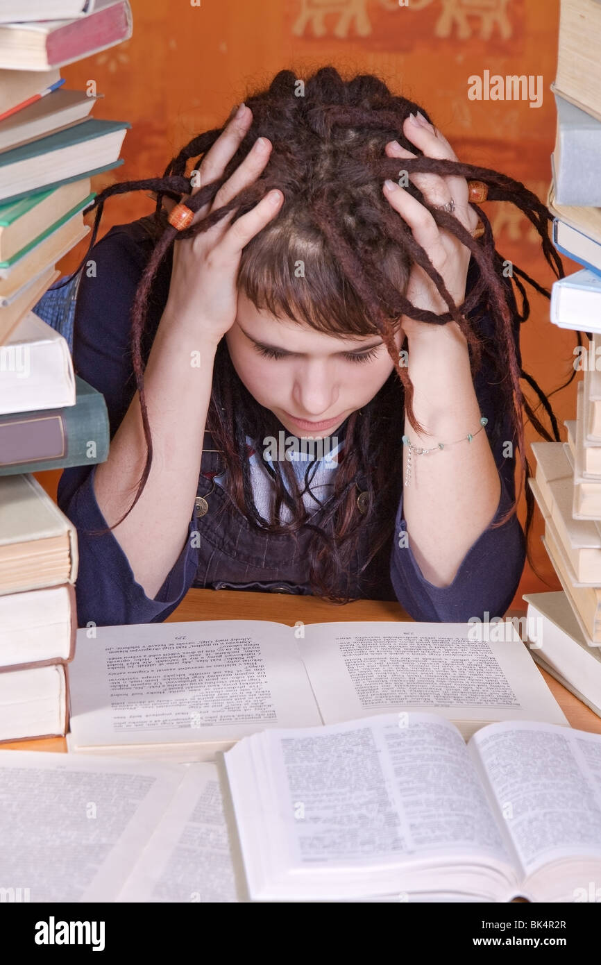 learner with books Stock Photo - Alamy