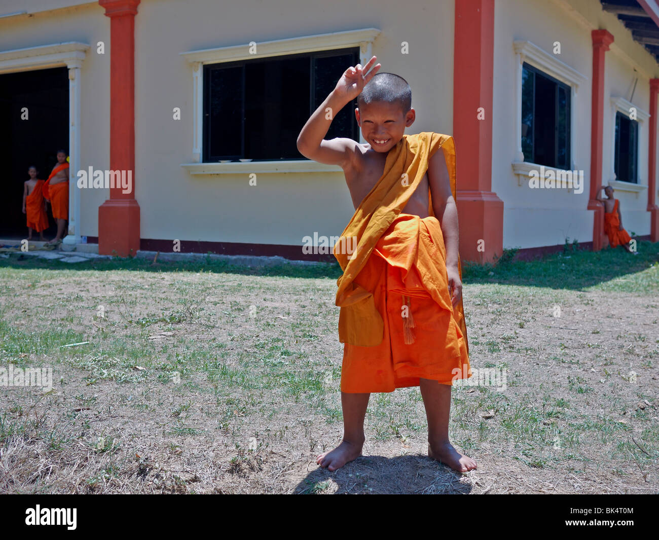 Boy monk at a Thai Buddhist Temple. Thailand S. E. Asia Stock Photo - Alamy