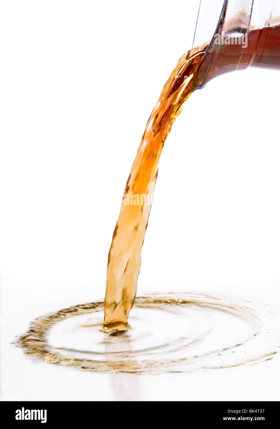 pouring tea on white background Stock Photo - Alamy