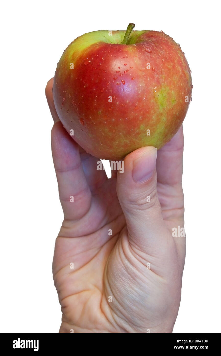 Hand apple on white Cut Out Stock Images & Pictures - Alamy