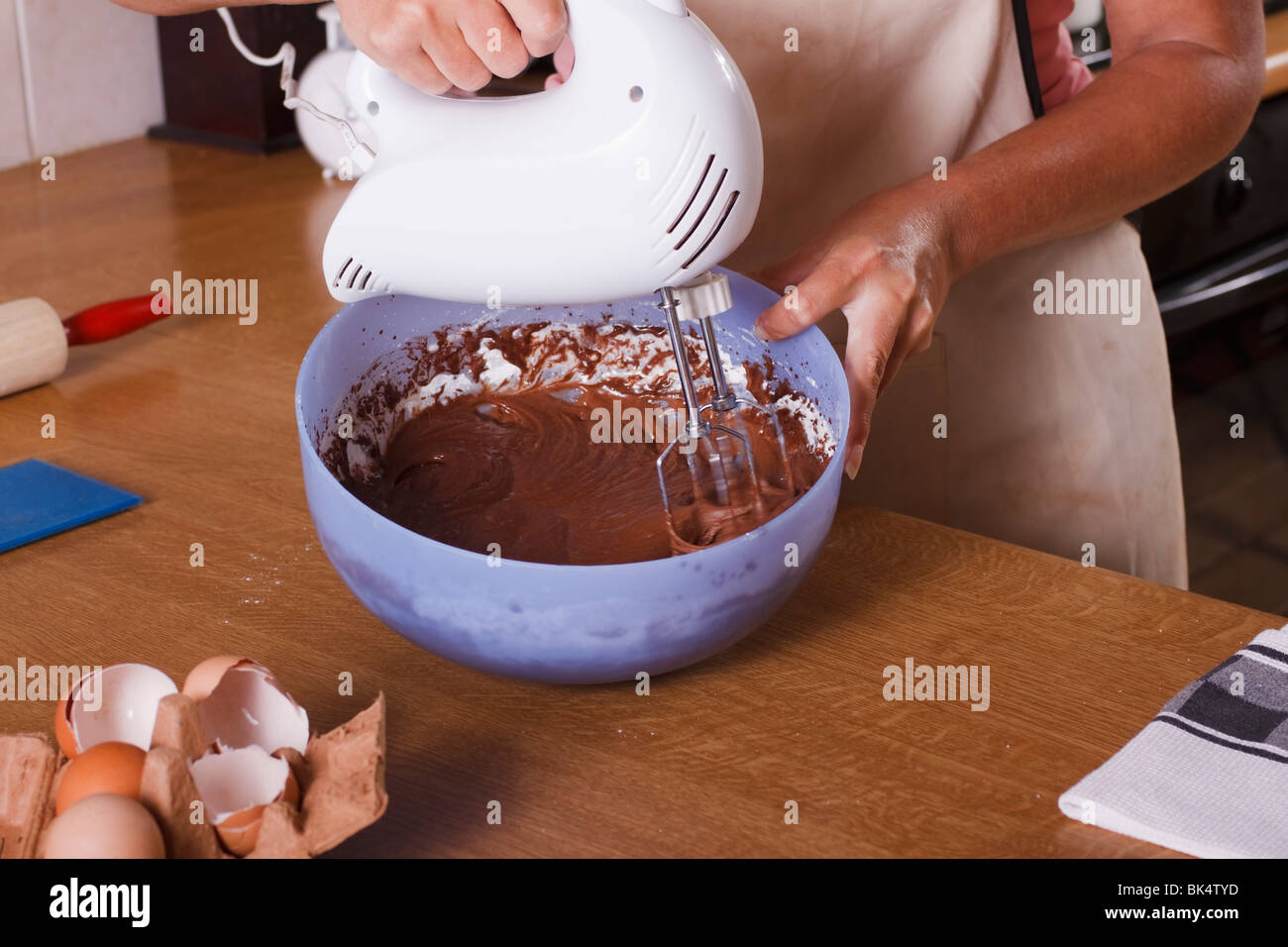 Woman mixing a cake food mixer hi-res stock photography and images - Alamy