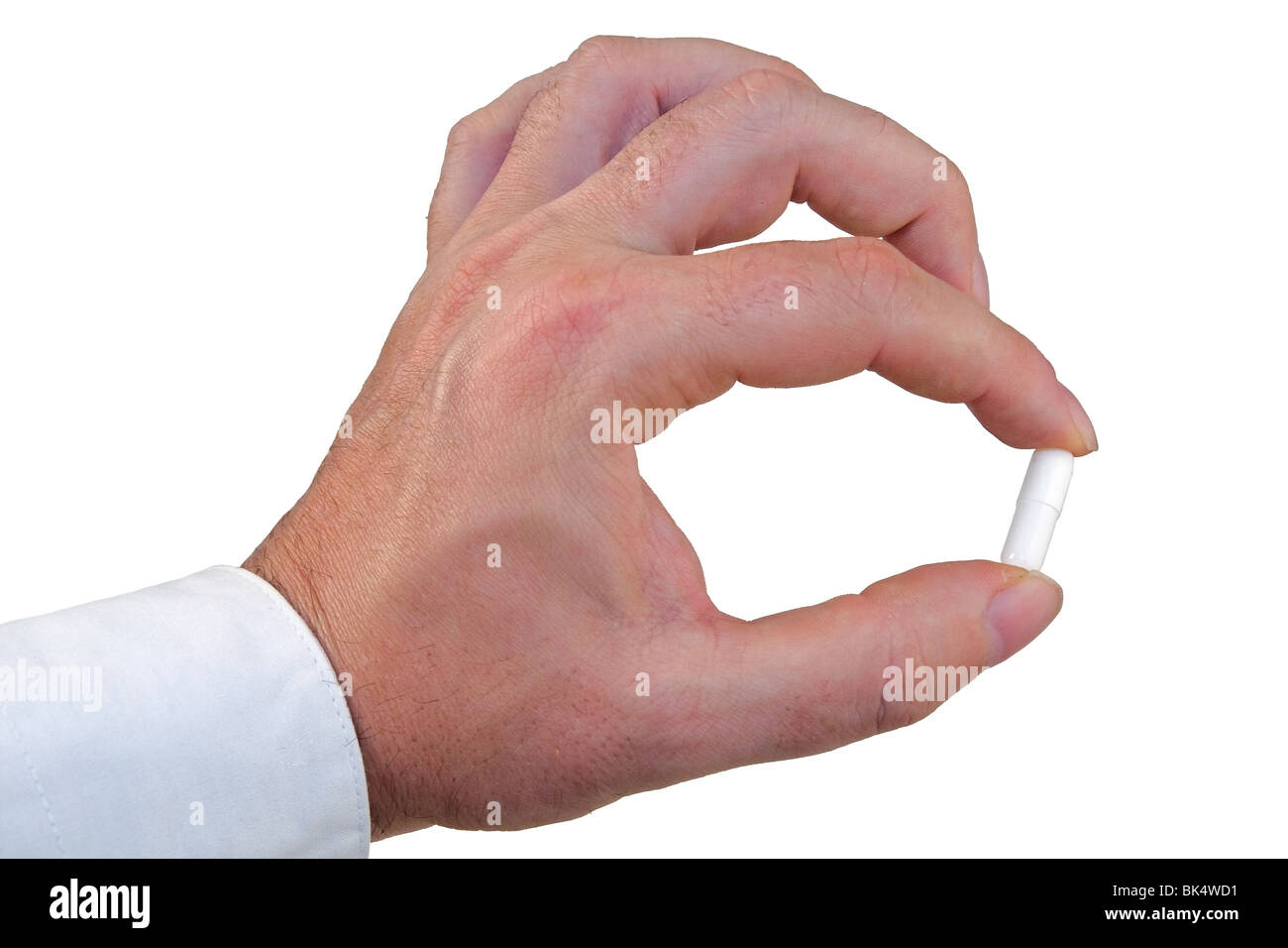 capsule in hand Stock Photo - Alamy