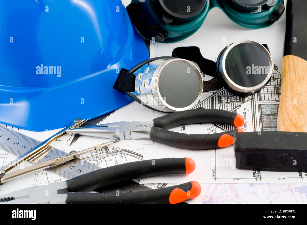 hard hat and working tools Stock Photo - Alamy
