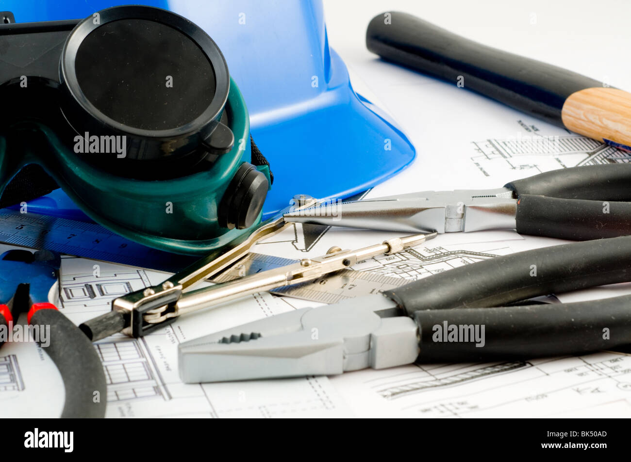 hard hat and working tools Stock Photo - Alamy