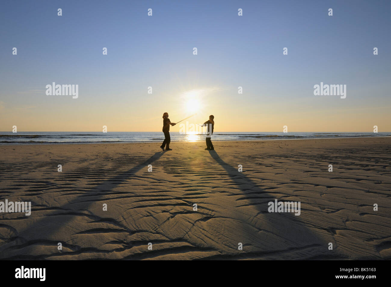 Boys playing outside sword hi-res stock photography and images - Alamy