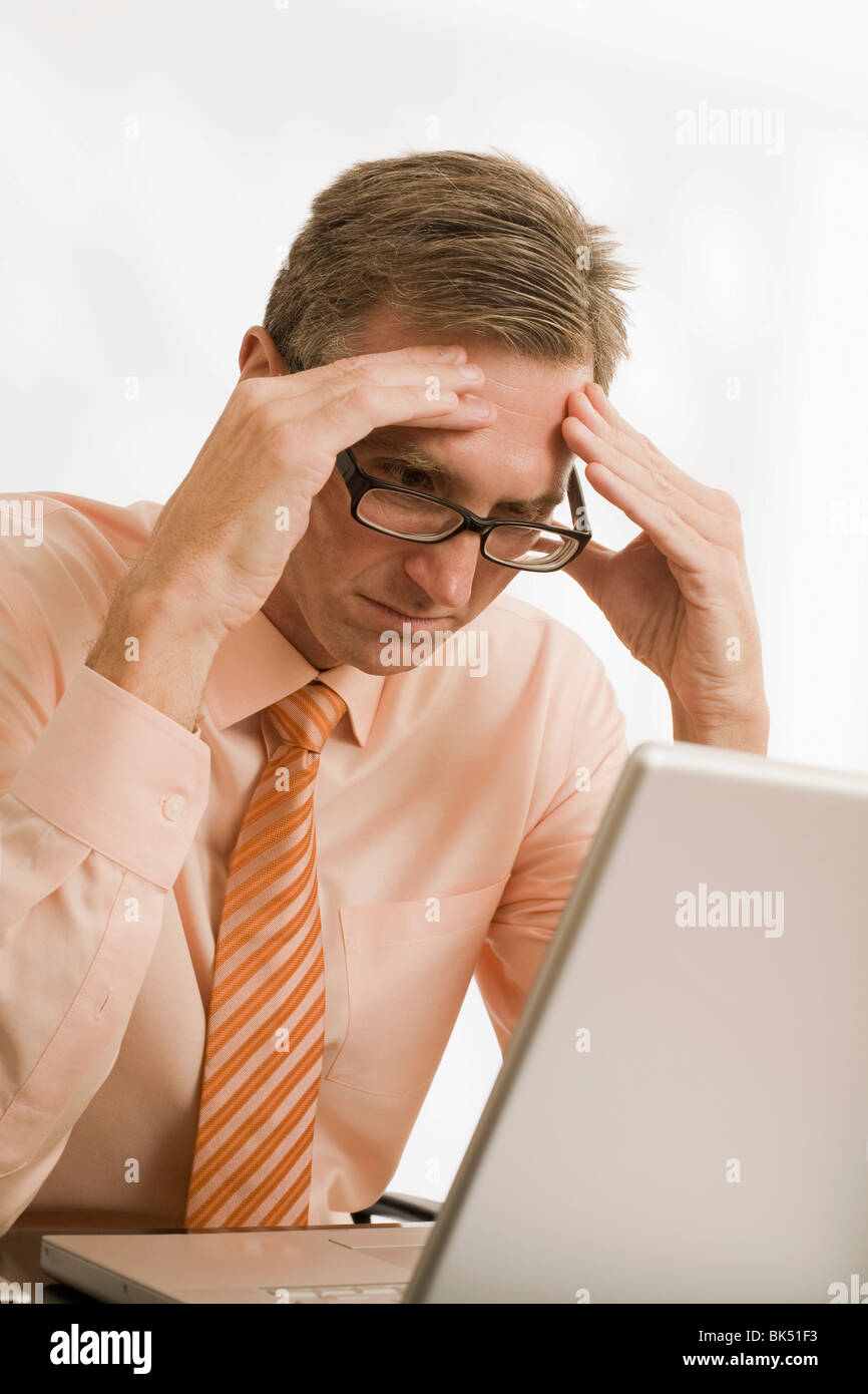 Slumped over desk hi-res stock photography and images - Alamy