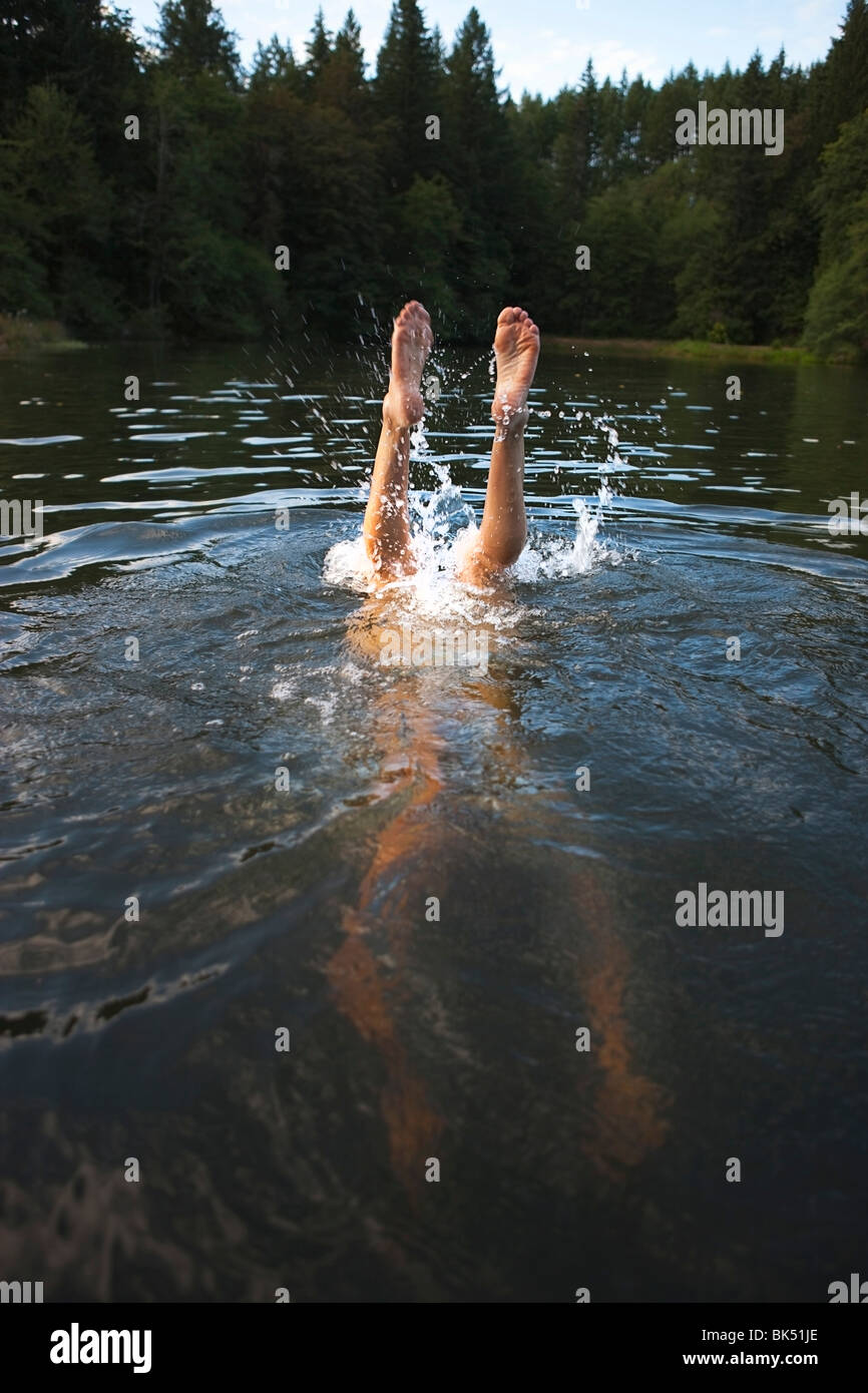 Teenage Girl Diving to the Bottom of the Lake, Near Portland, Oregon ...