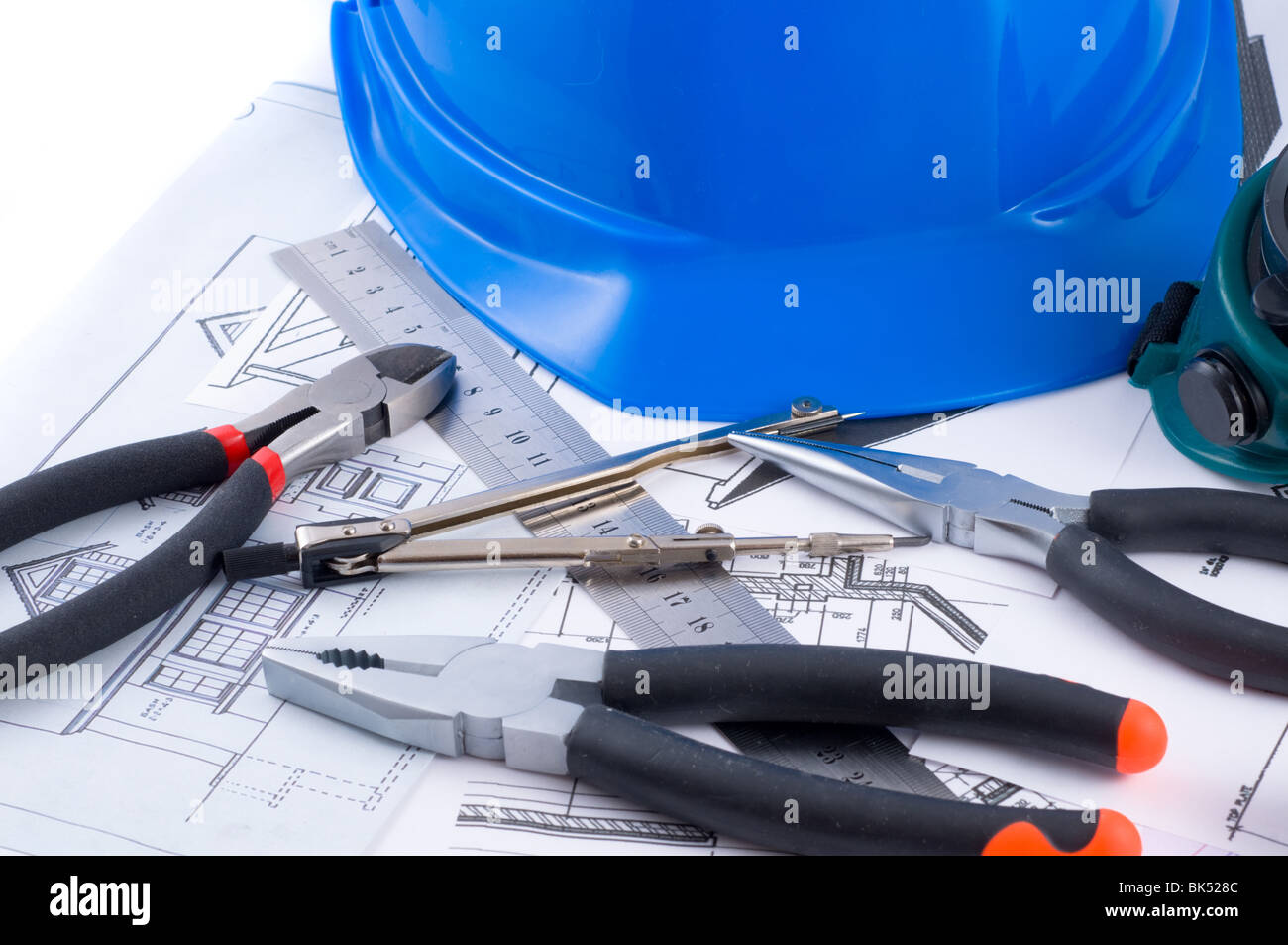 hard hat and working tools Stock Photo - Alamy