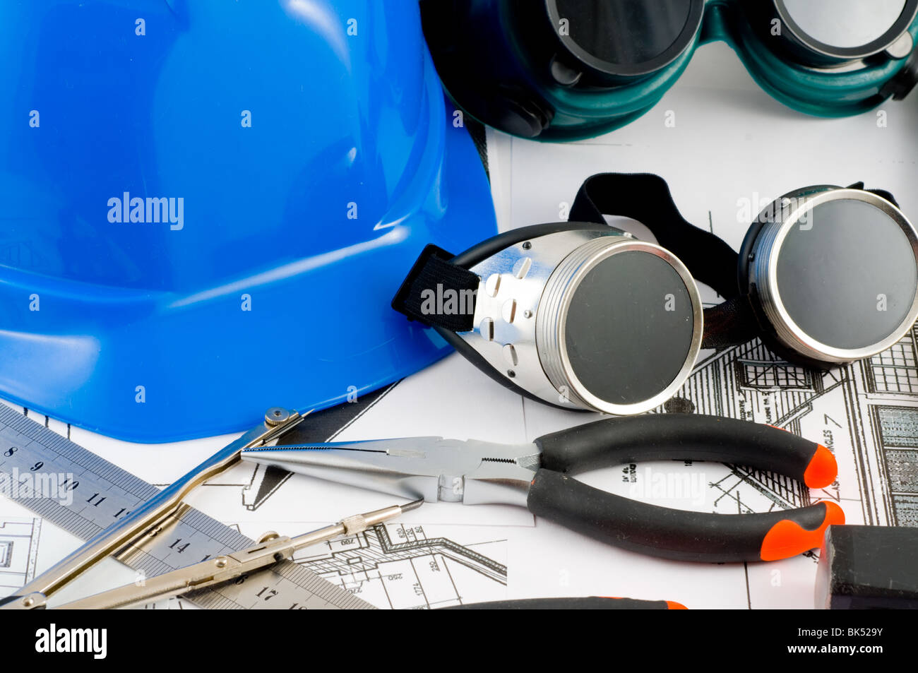 hard hat and working tools Stock Photo - Alamy