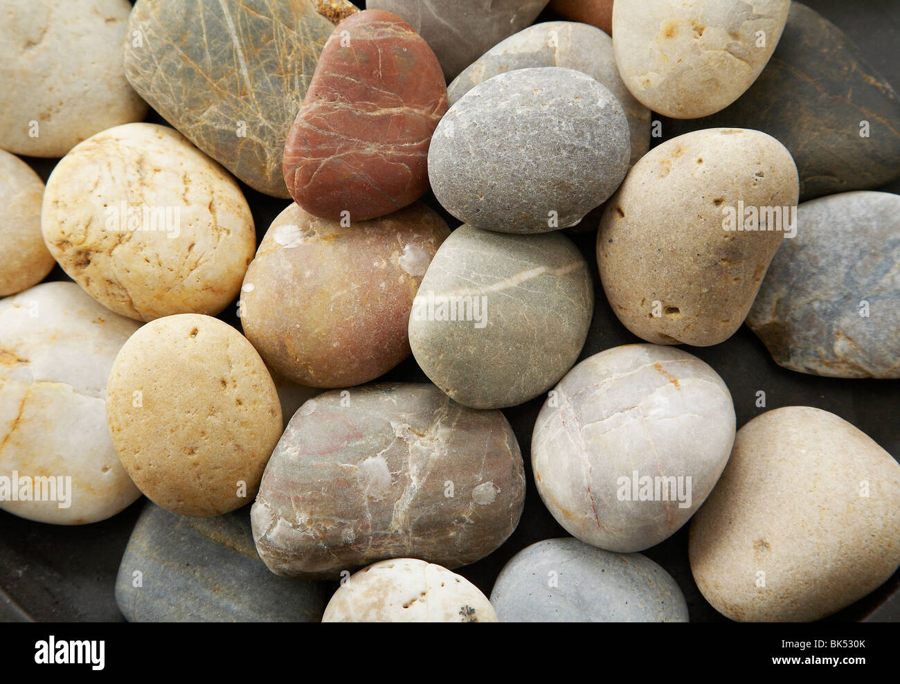 Close up of colored pebbles Stock Photo - Alamy