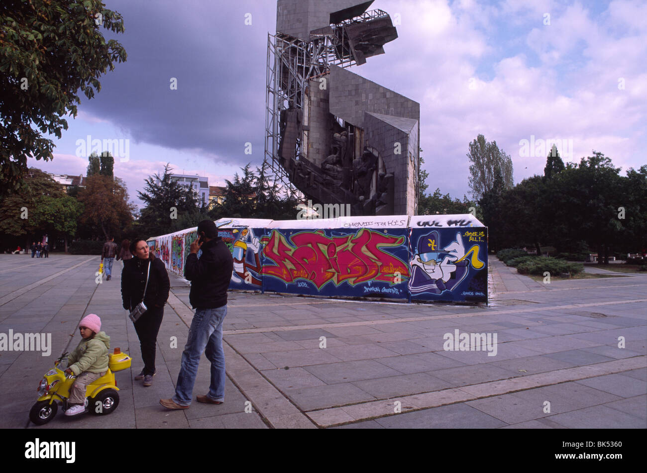 Graffiti and communist-era art clash in a park next to the National ...