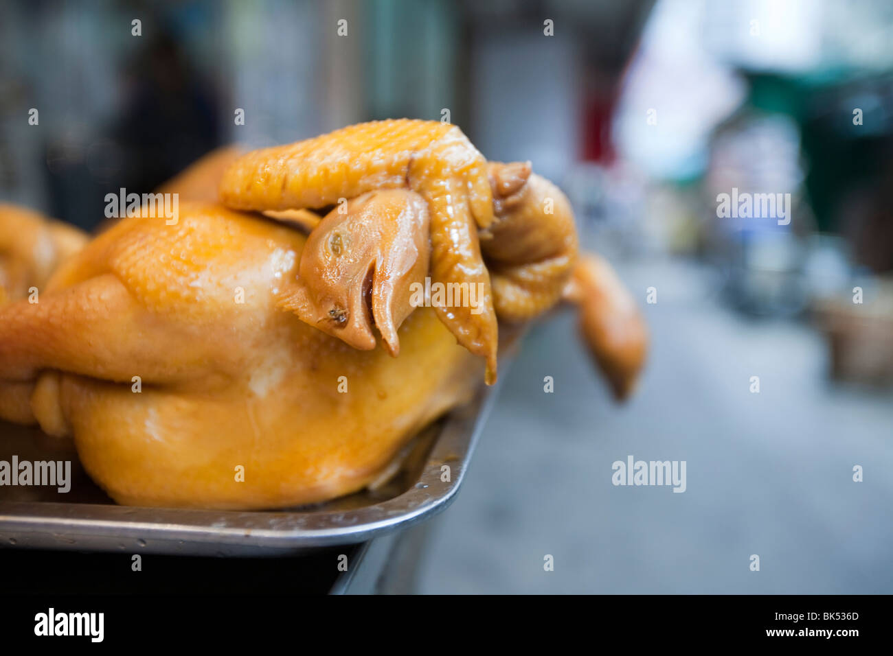 Young chickens on a street food stall in Kowloon, Hong Kong, China ...