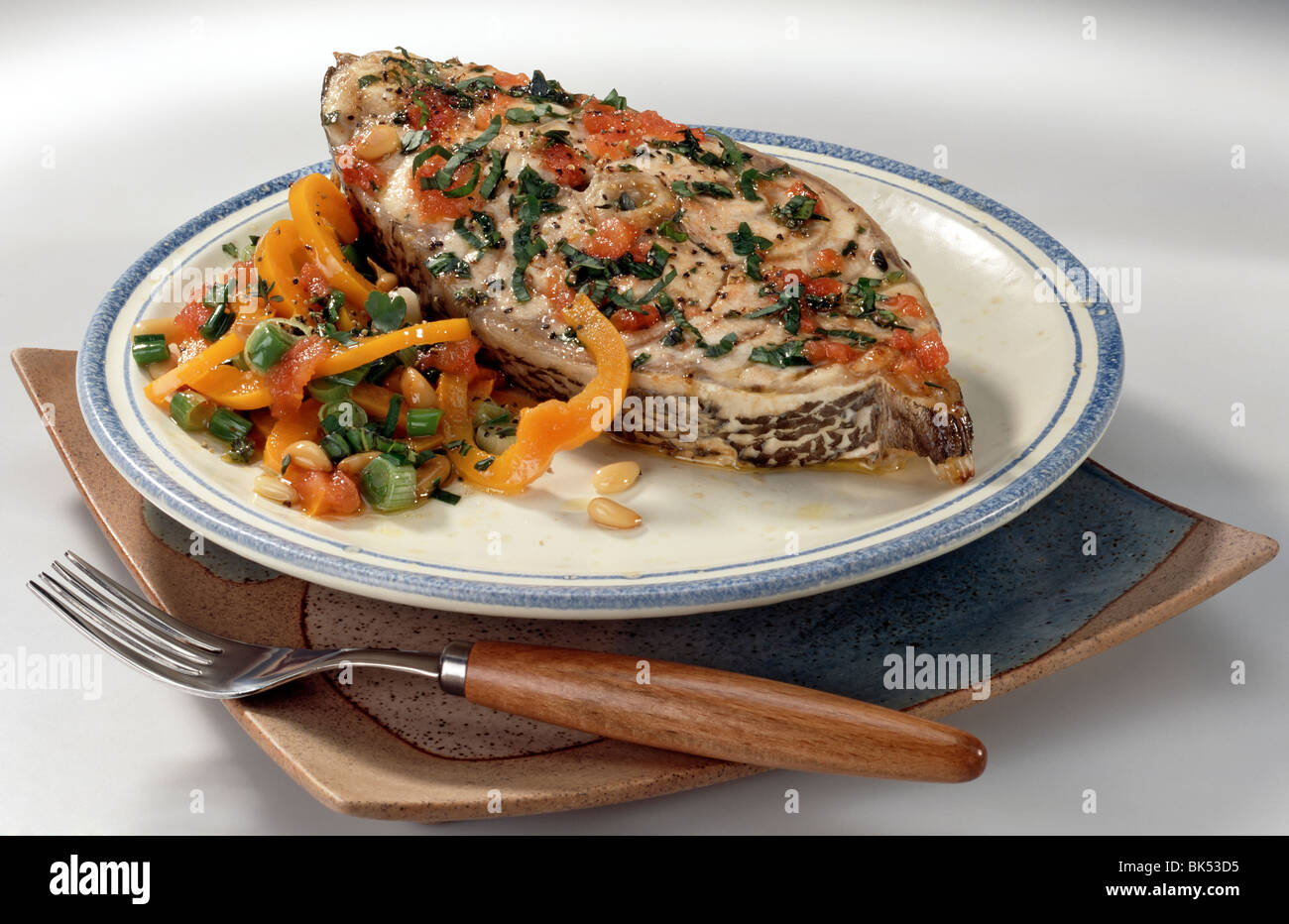 Baked fish with vegetables Stock Photo - Alamy