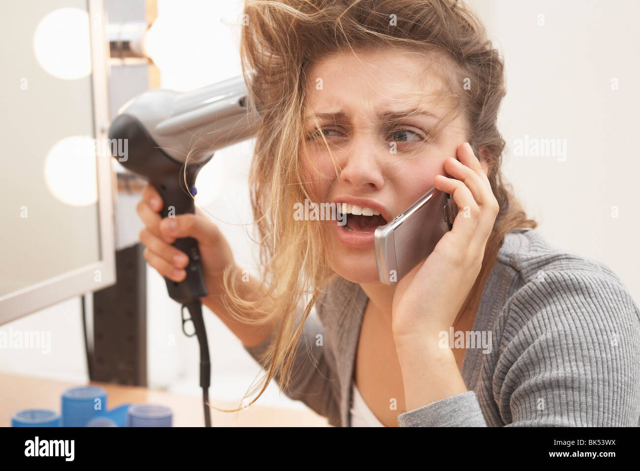Woman messy blonde hair face hi-res stock photography and images - Alamy