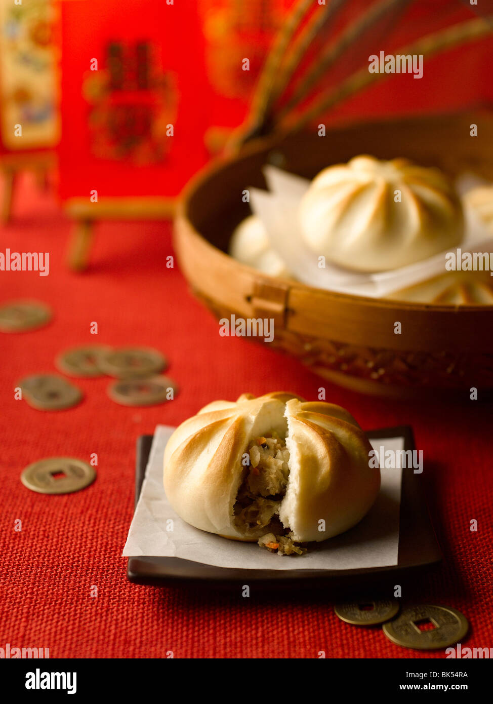 Chinese Buns and Coins Stock Photo - Alamy