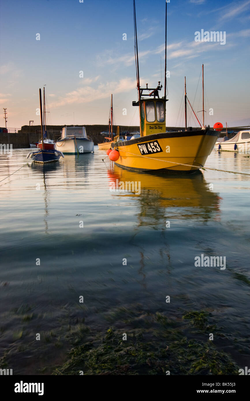 Fishing boats in Mousehole Harbor Stock Photo - Alamy