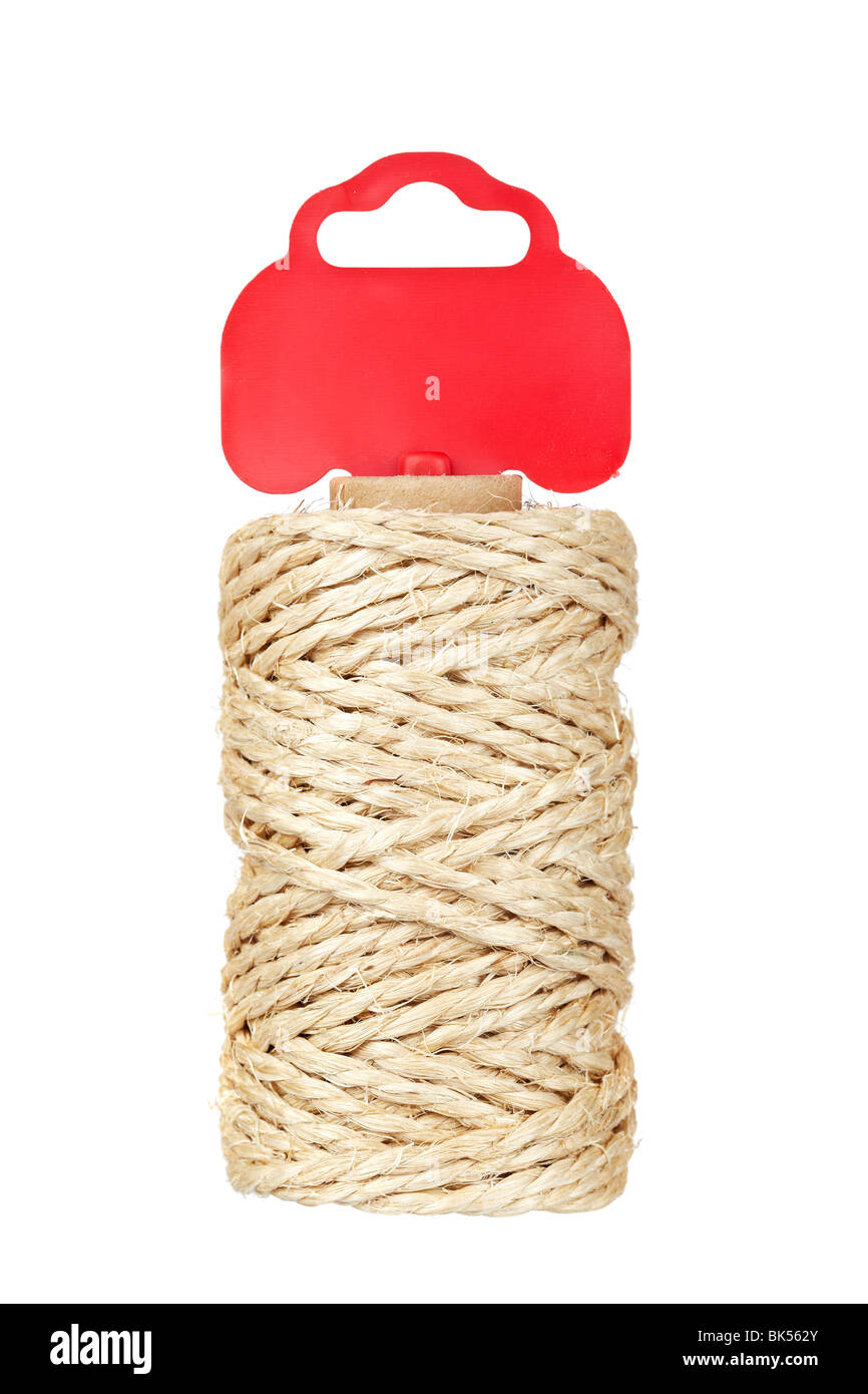 A roll of hemp rope with red tag isolated on white background Stock ...